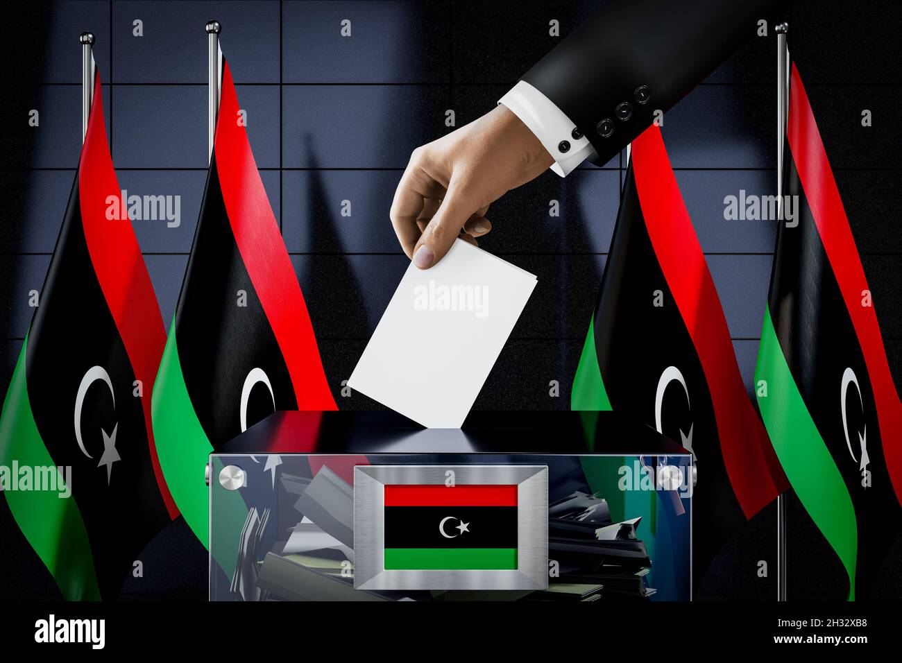 Libya flags, hand dropping ballot card into a box - voting, election ...