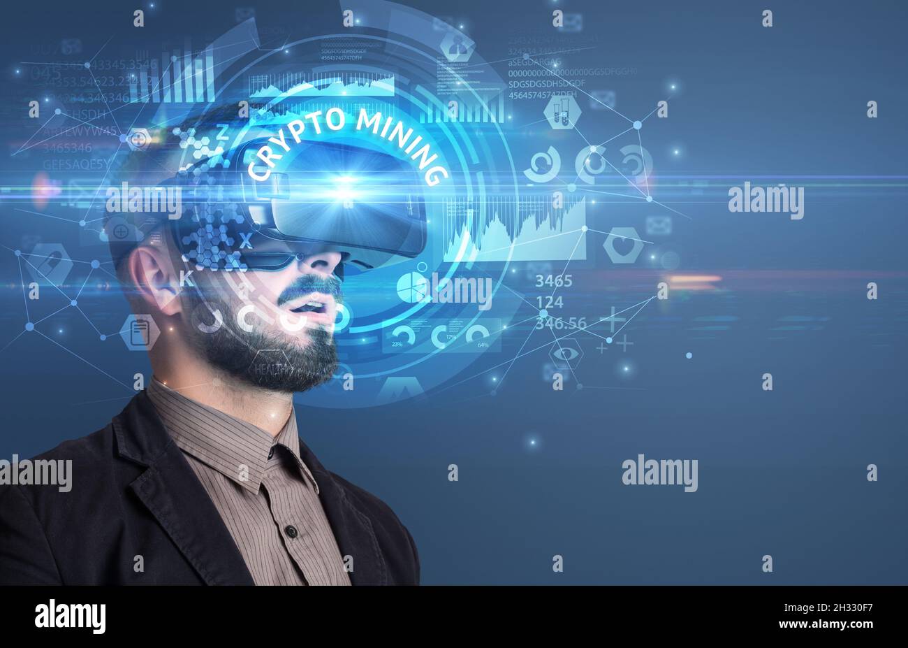 Businessman looking through VR glasses Stock Photo - Alamy