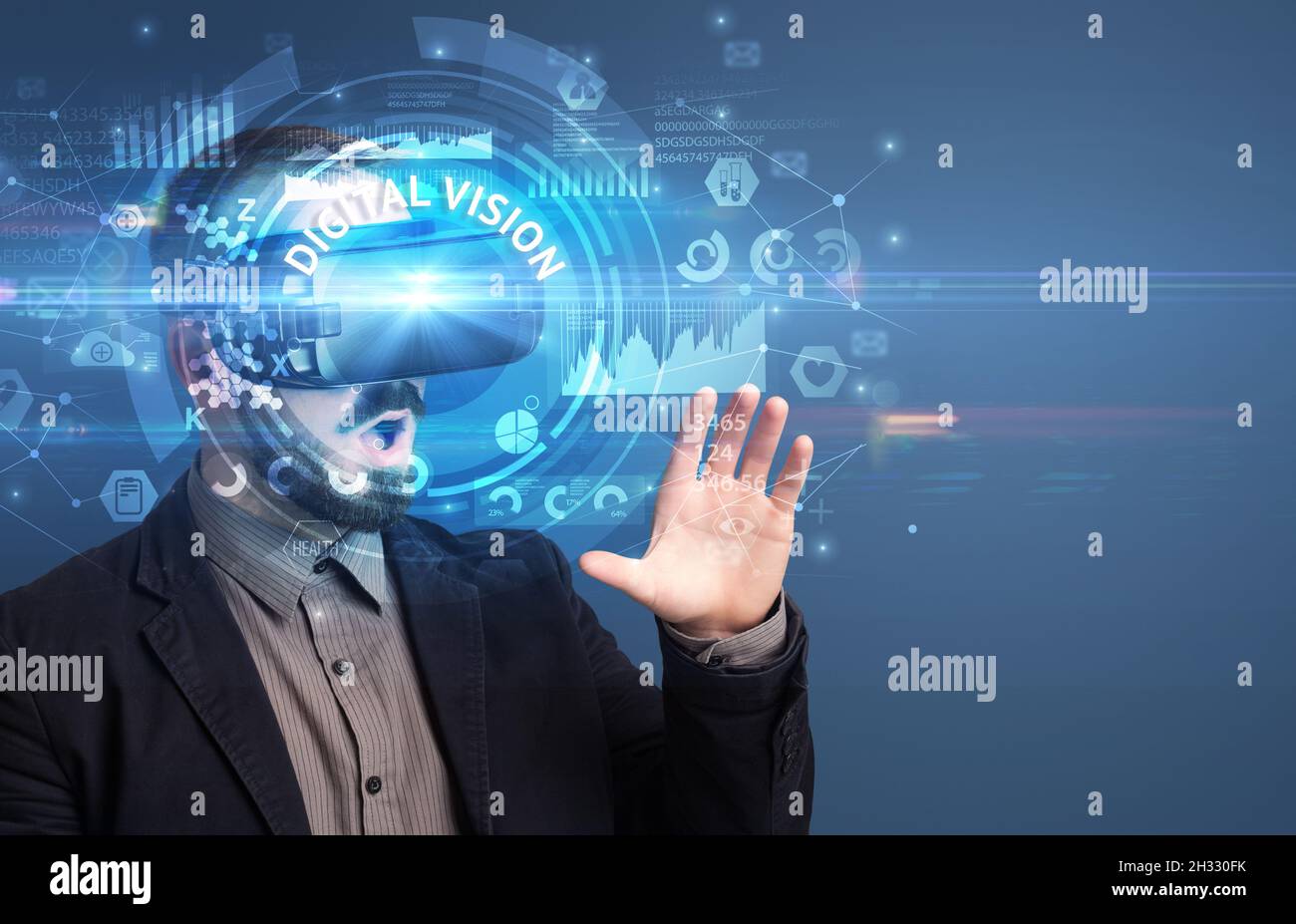 Businessman looking through VR glasses Stock Photo - Alamy