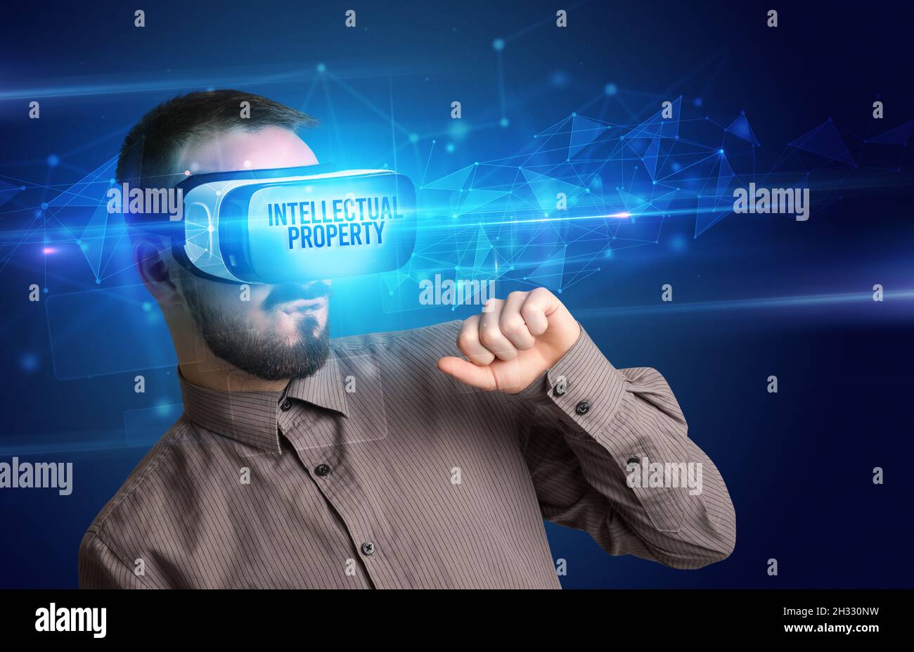 Businessman looking through Virtual Reality glasses, virtual security ...