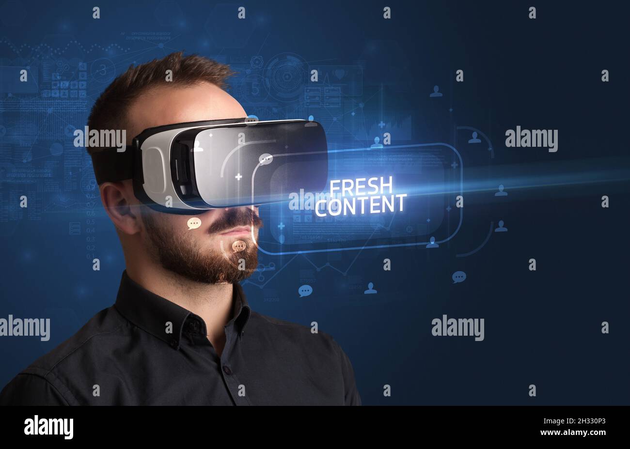 Businessman looking through Virtual Reality glasses, social media ...