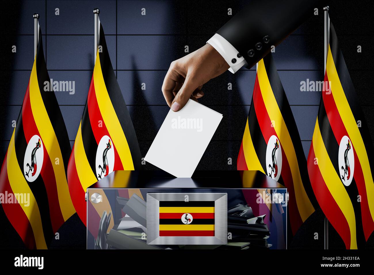 Uganda flags, hand dropping ballot card into a box - voting, election ...