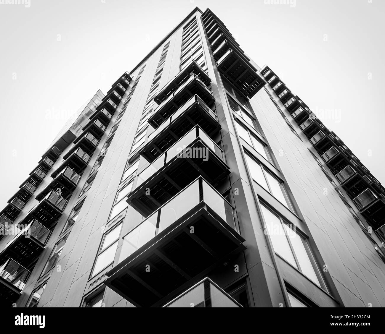 Grayscale shot of a modern residential building in the daylight Stock ...