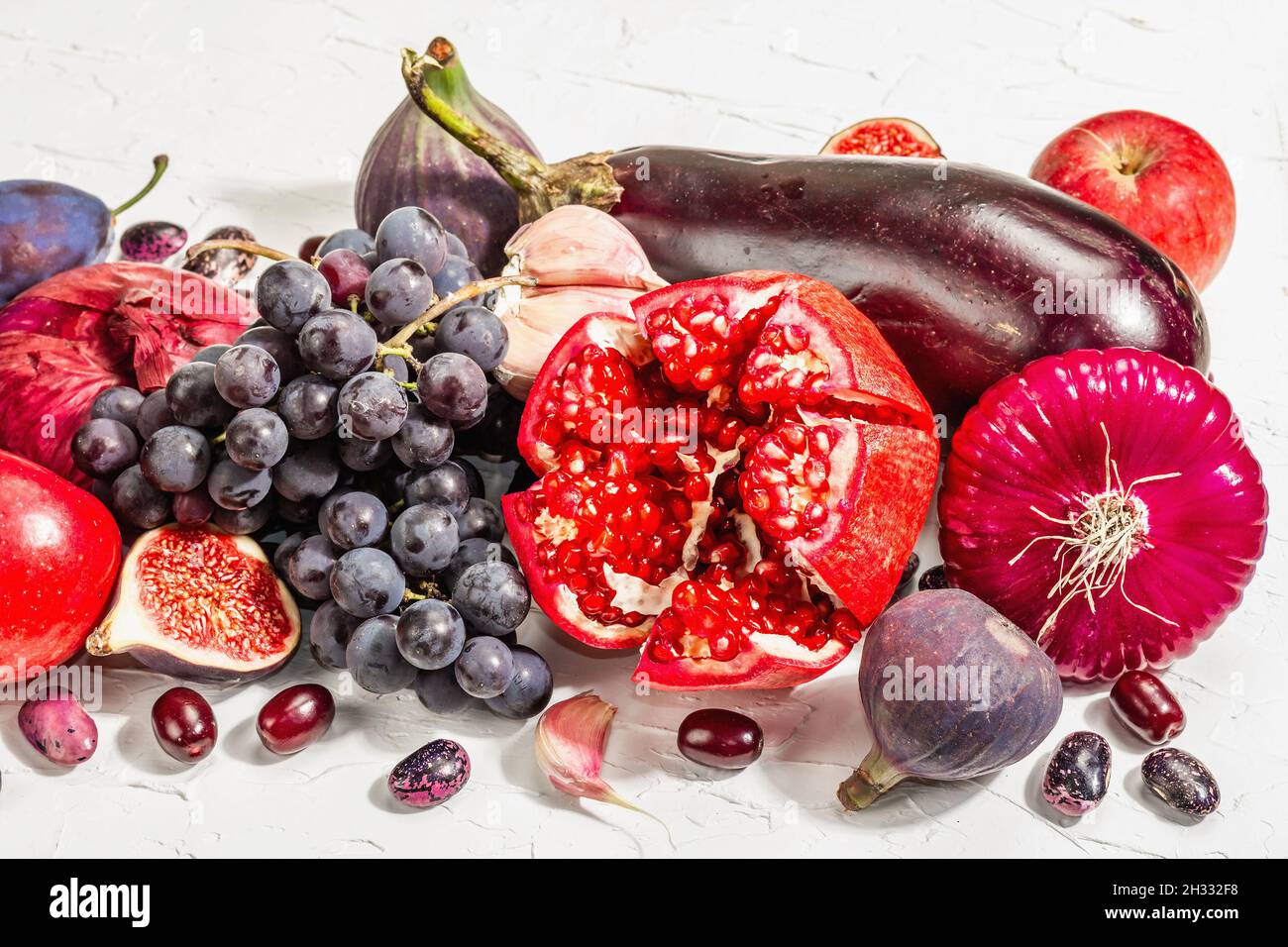 Blue, red and purple food. Culinary background of fruits and vegetables ...