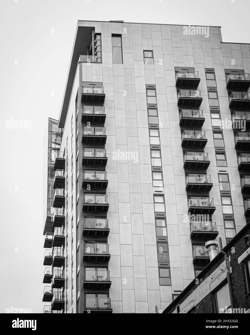 Grayscale shot of a modern residential building in the daylight Stock ...