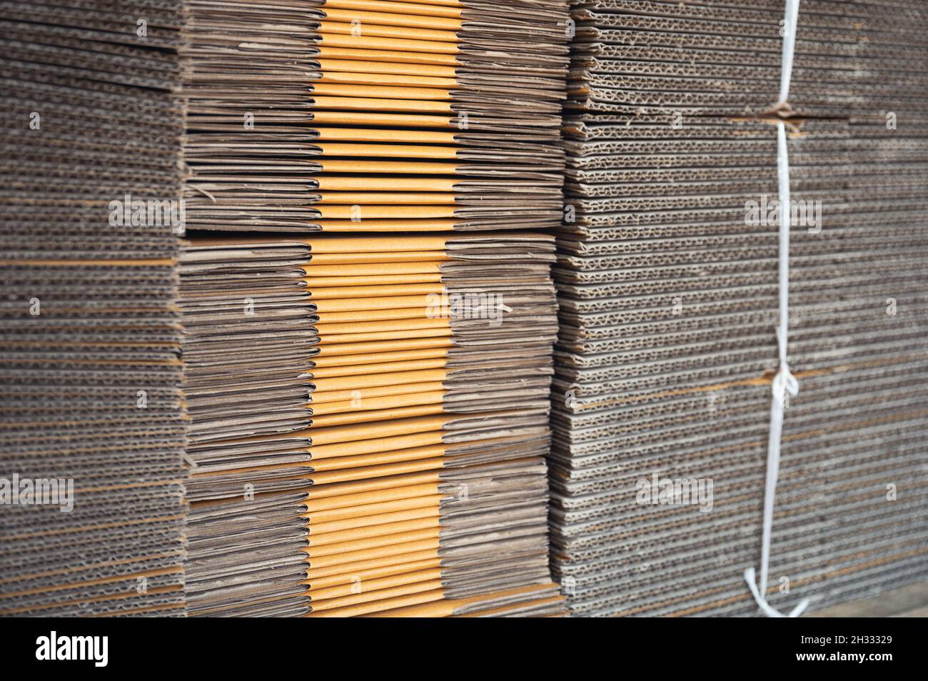 Brown cardboard, craft paper corrugated stacked for packaging Stock ...