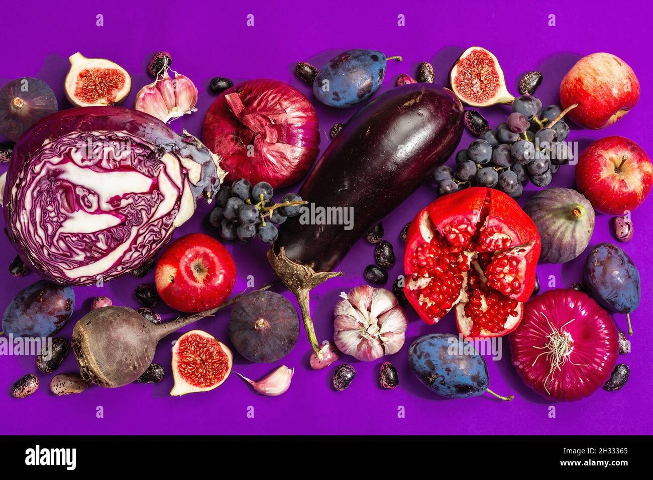 Blue, red and purple food. Culinary background of fruits and vegetables ...