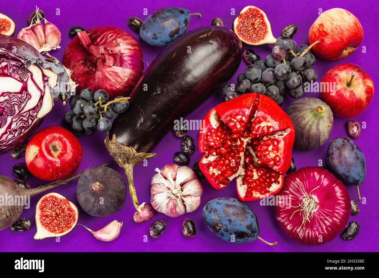 Blue, red and purple food. Culinary background of fruits and vegetables ...