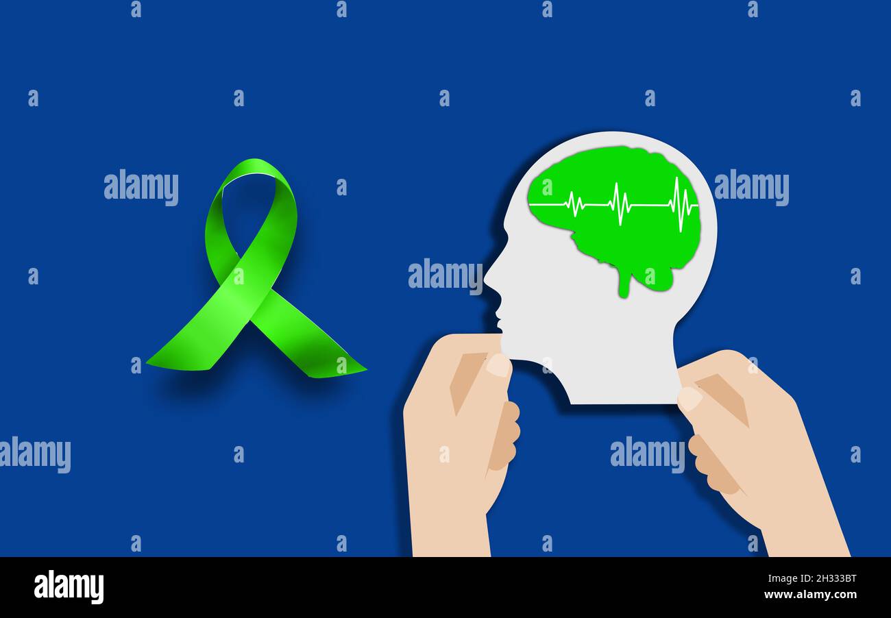 Man Head With green Brain sign and Awareness Ribbon symbol on blue ...