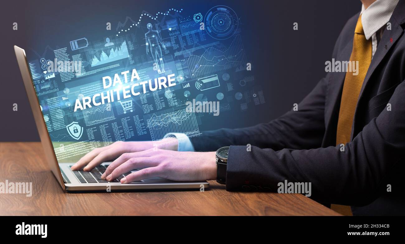 Businessman working on laptop concept Stock Photo - Alamy