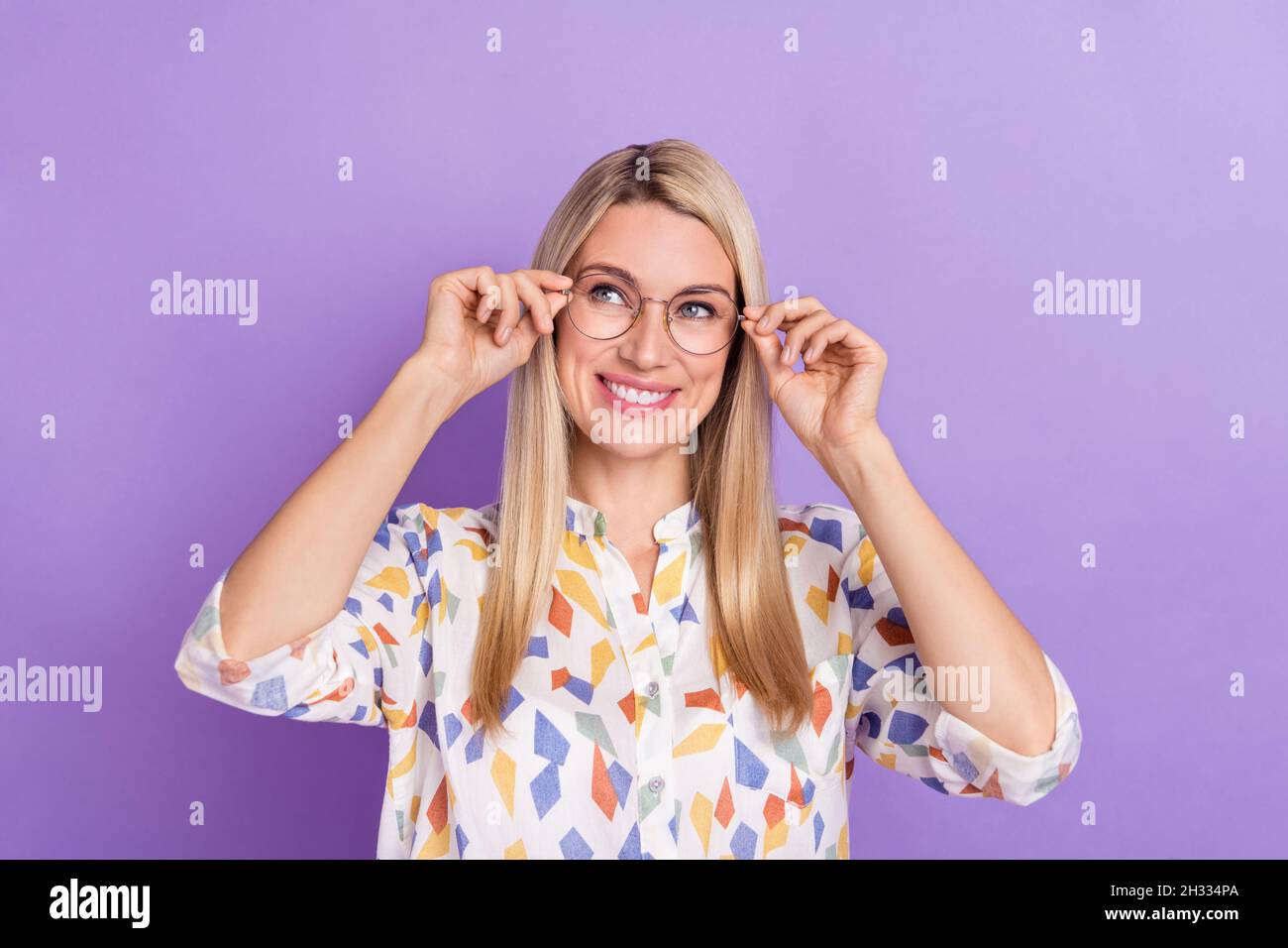 Photo of pretty charming young woman wear print shirt arms spectacles ...