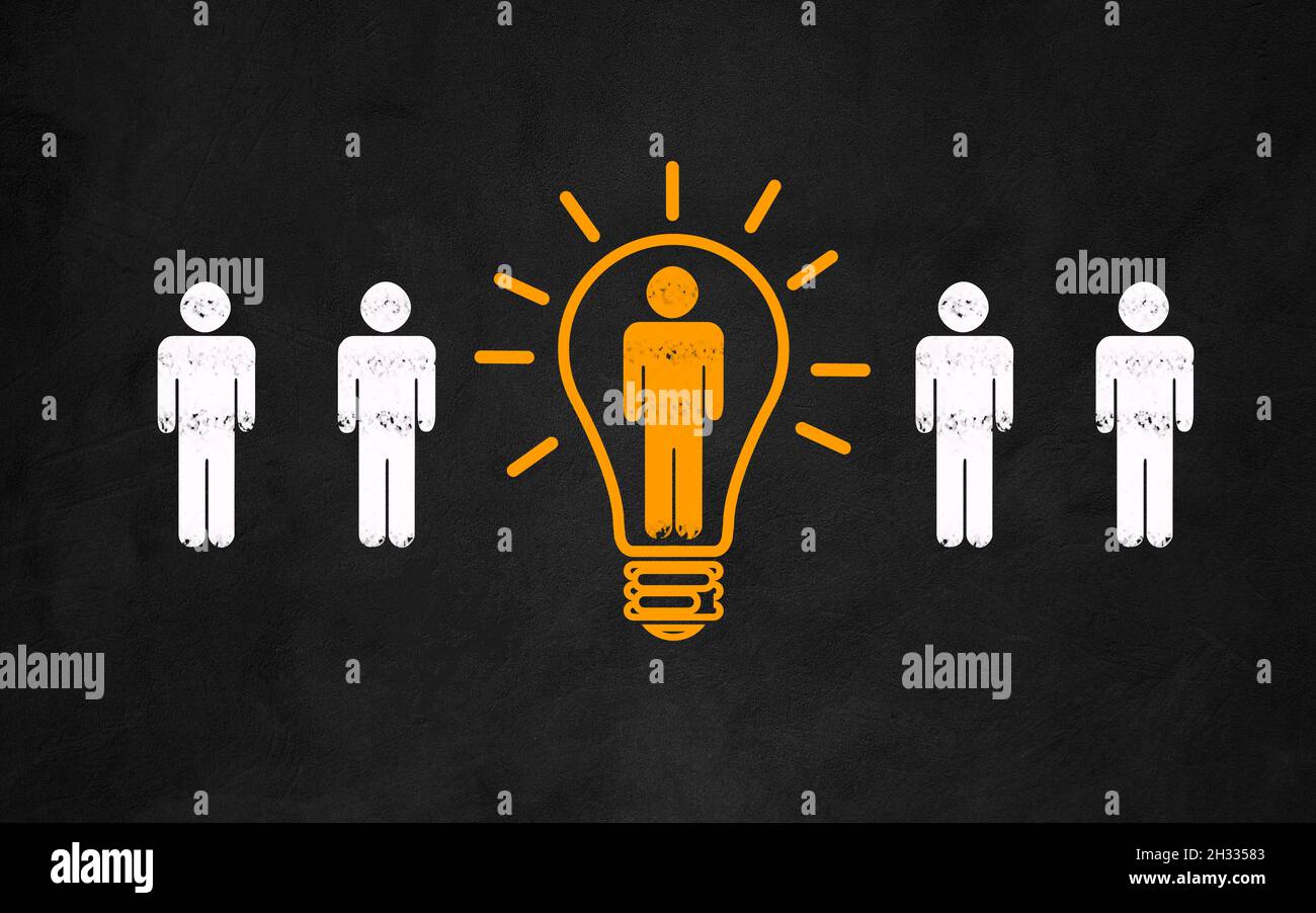 Man Inside glowing Light Bulb standing Out from the Crowd. talent and ...