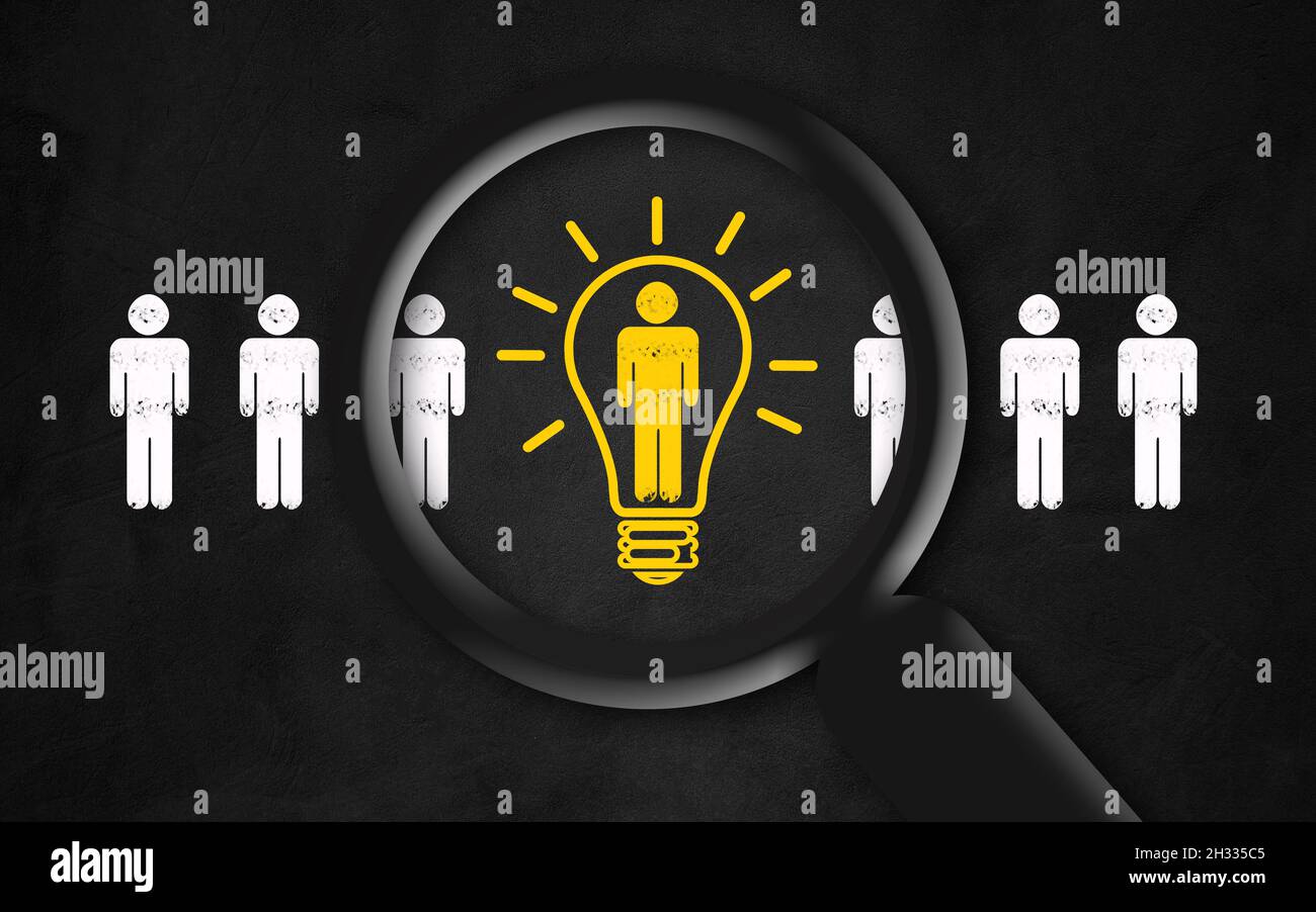 Man Inside glowing Light Bulb standing Out from the Crowd. talent and ...