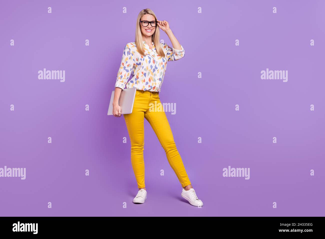 Photo of dreamy pretty young woman wear print shirt arm spectacles ...