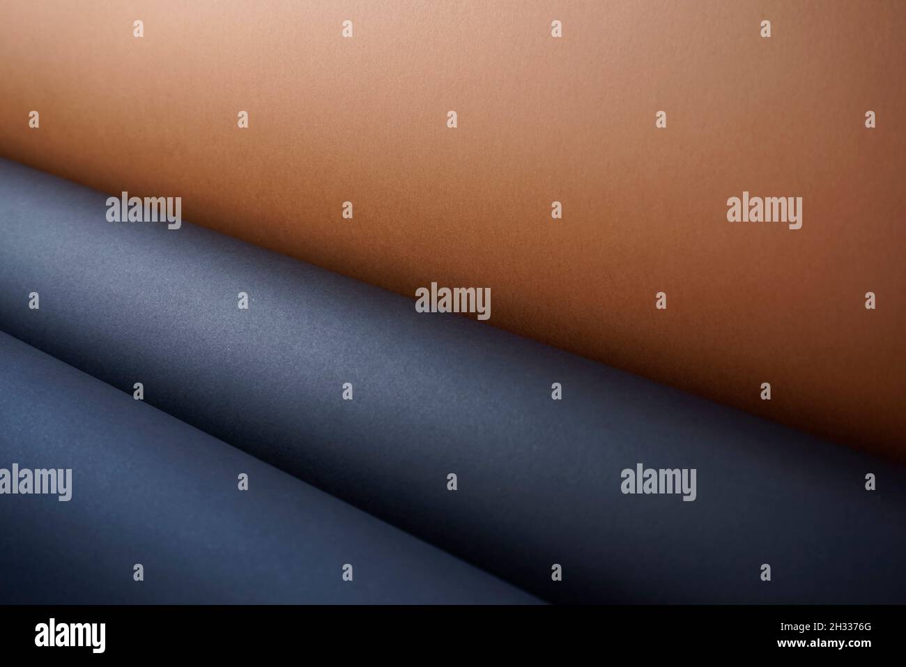 Abstract paper texture background. Burnt yellow, blue grey roll papers ...