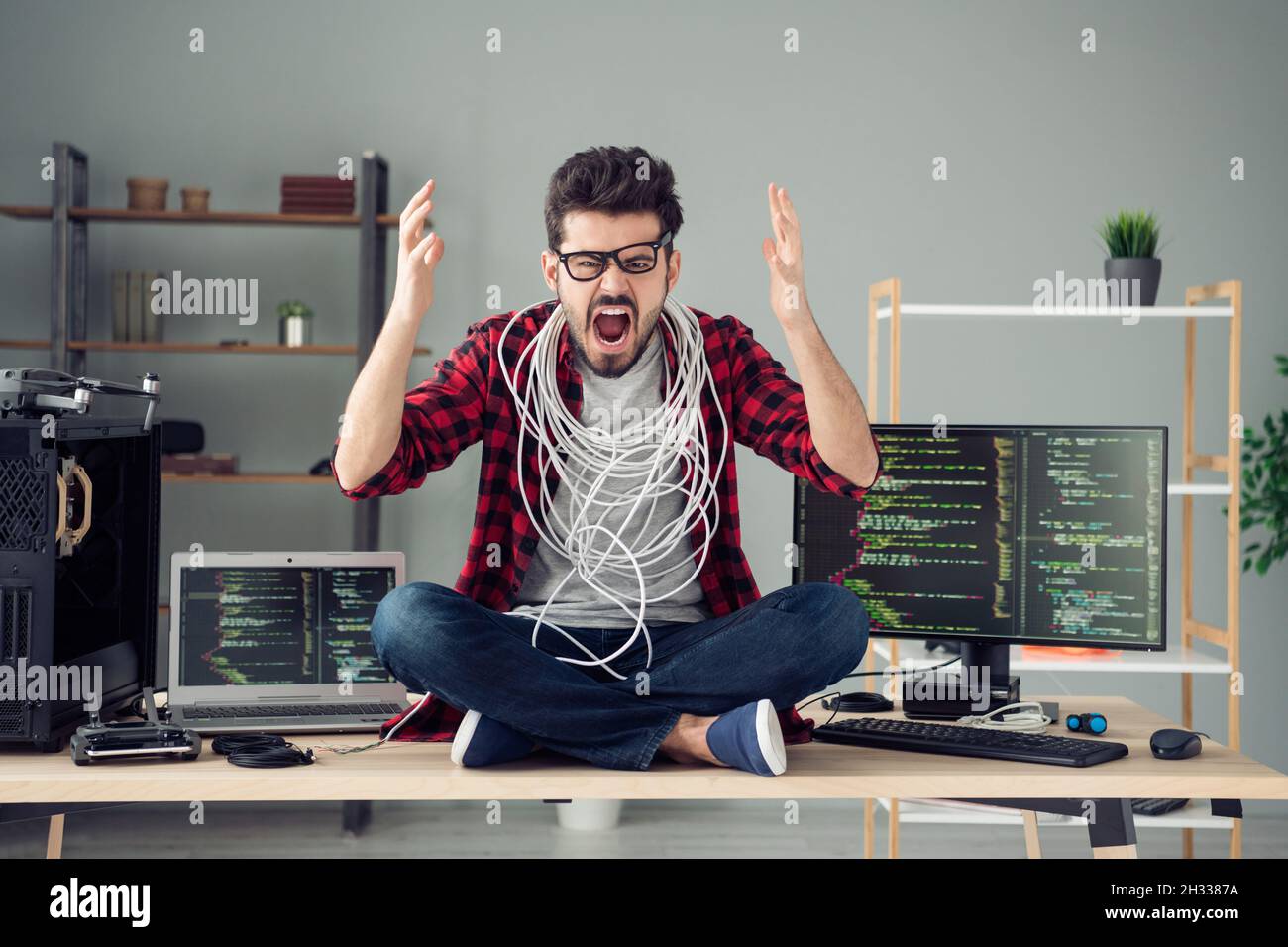 Portrait of attractive mad angry evil desperate frustrated guy hacker ...