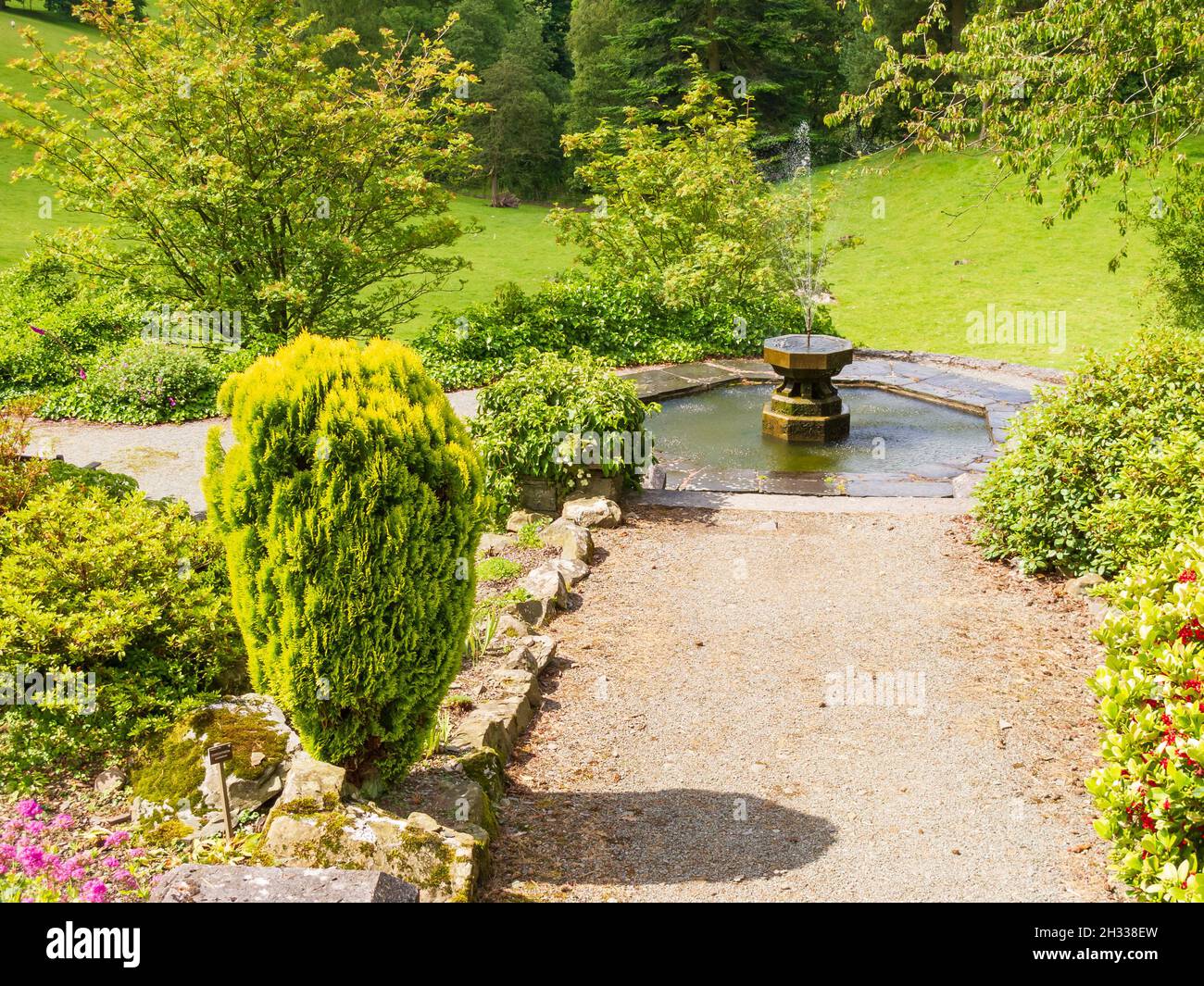 A water feature at Holehird Gardens, Troutbeck Bridge near Windermere ...