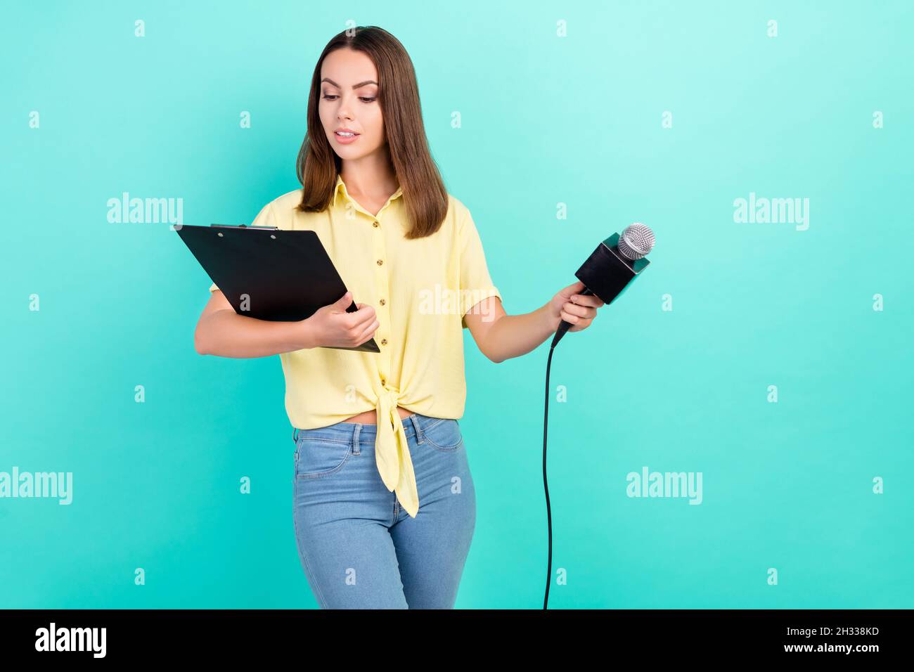 Photo of think young brunette lady take interview read paper wear ...