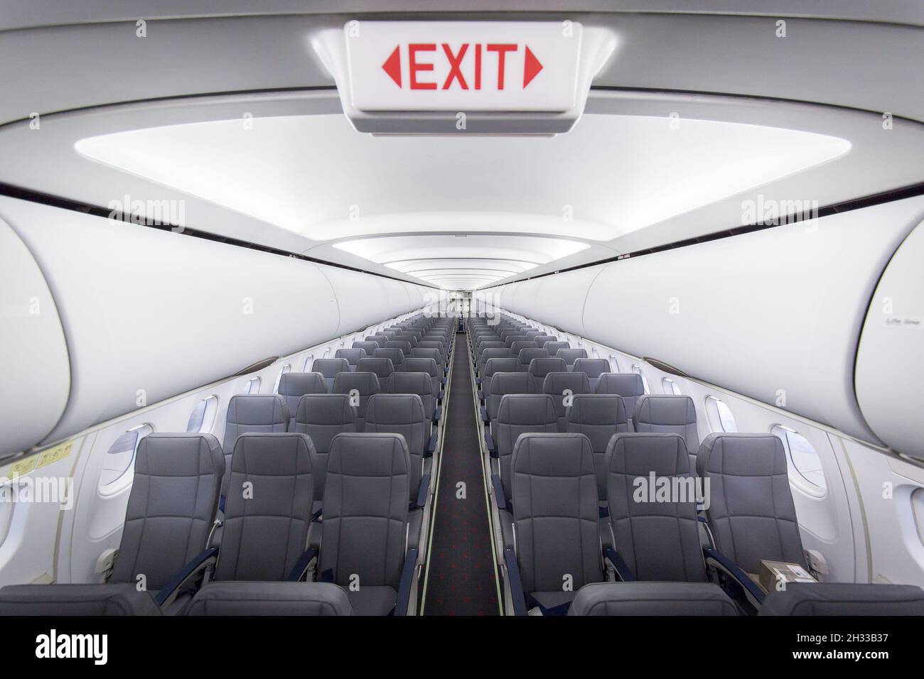 Airplane Cabin Interior Exit Sign High Resolution Stock Photography and ...