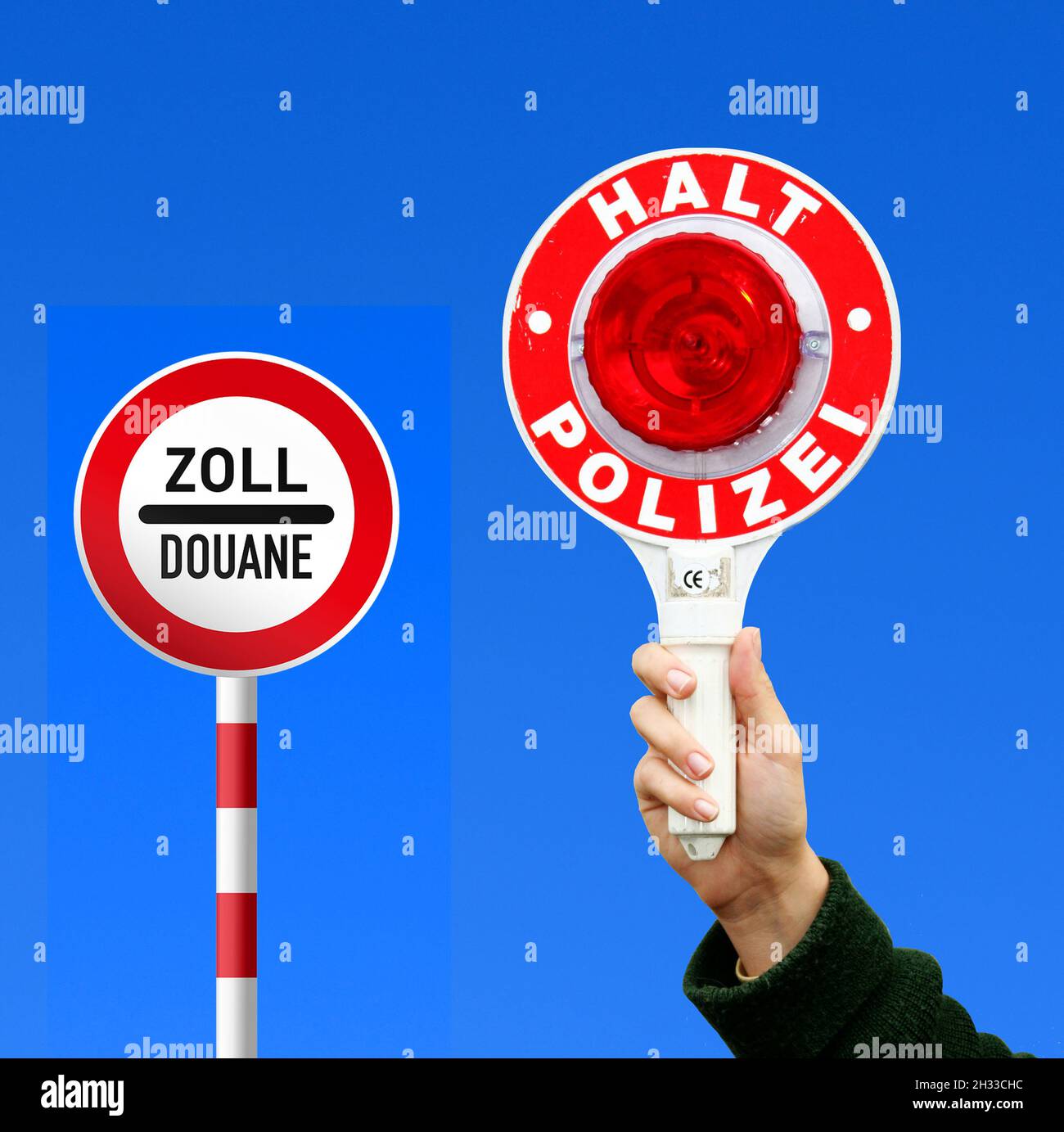 Eine Hand mit einer Polizeikelle, STOP, POLIZEI, Kontrolle ...