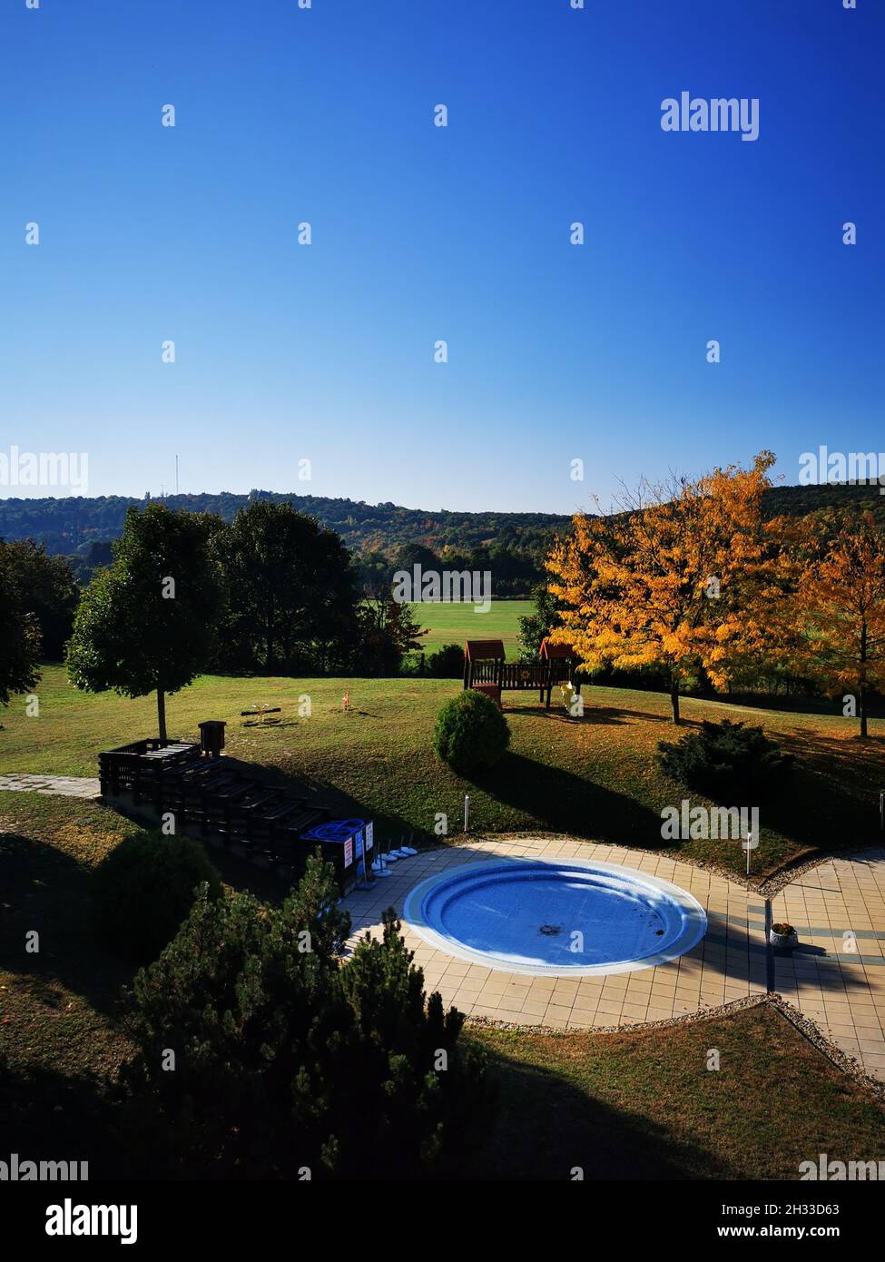 Round swimming pool on open air under the sunlight Stock Photo - Alamy
