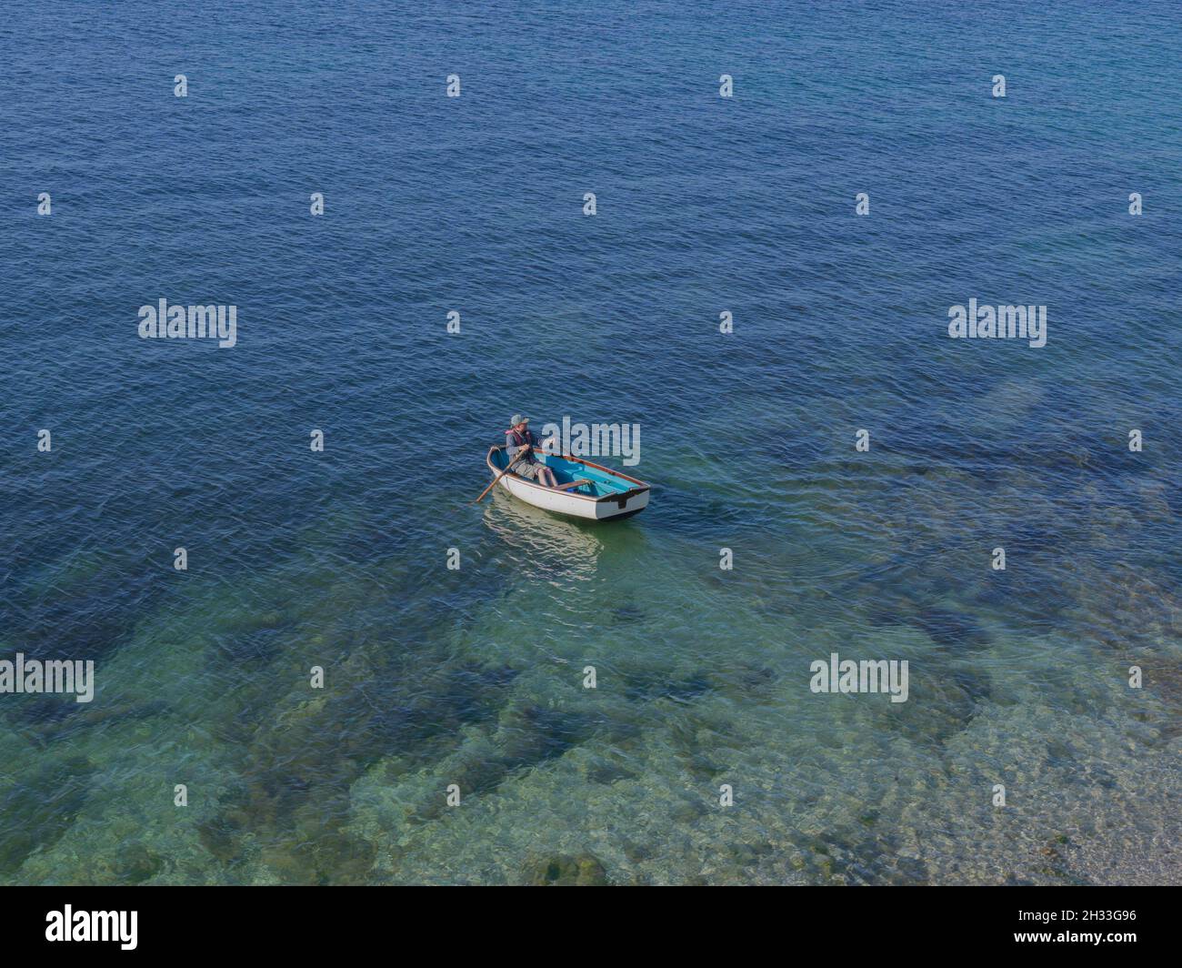 Rowing Boat Sea Stock Photo - Alamy