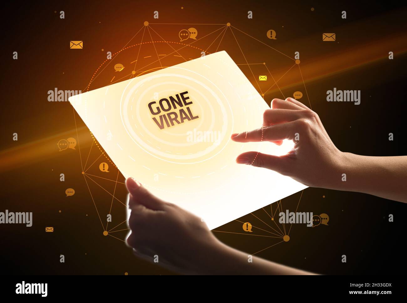 holding futuristic tablet, social media concept Stock Photo - Alamy