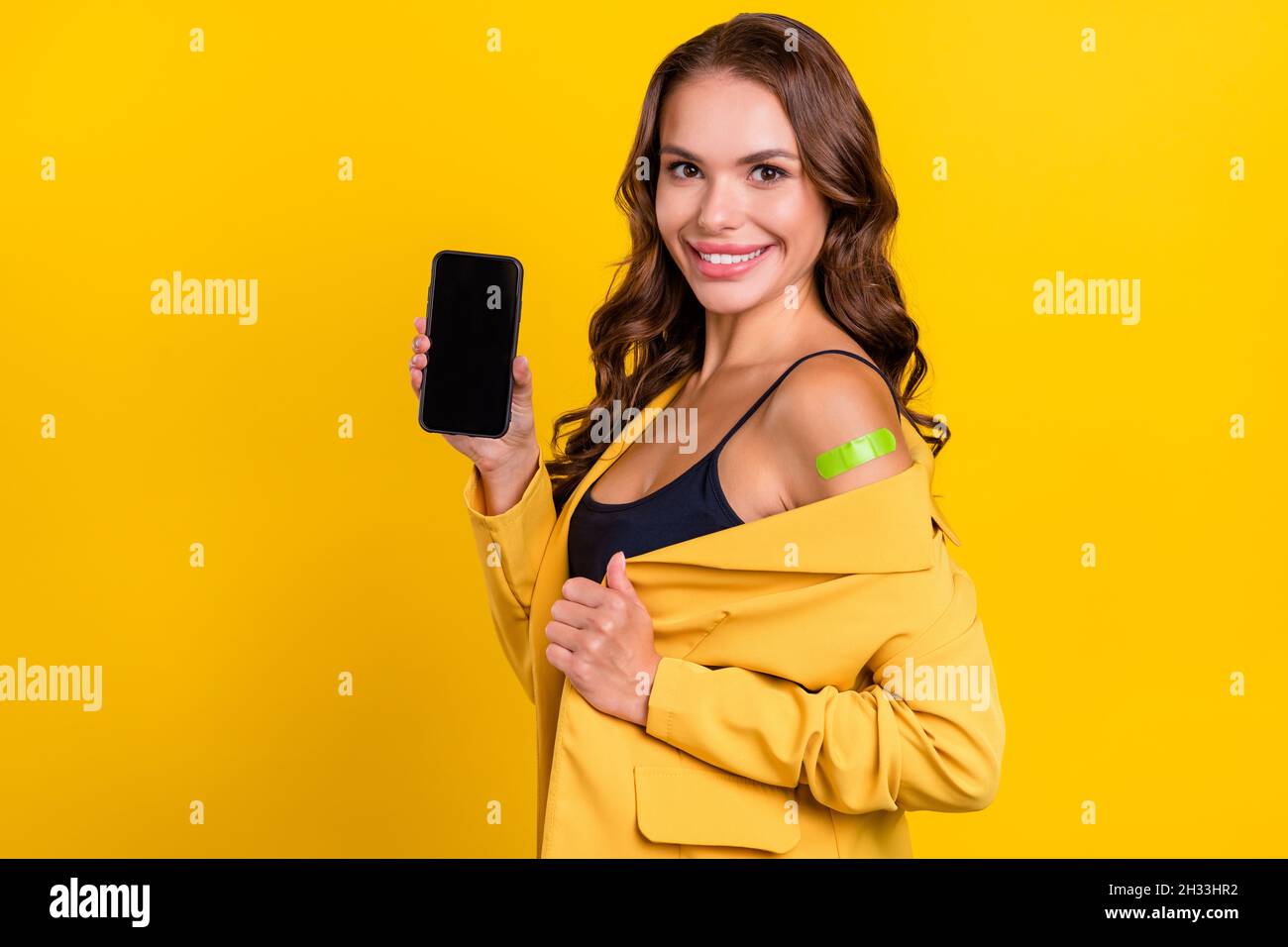 Photo of shiny attractive young woman dressed suit blazer holding ...