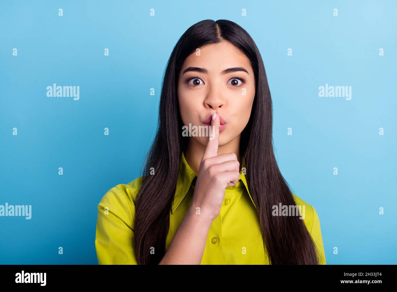 Photo of young woman cover finger lips shh keep secret confidential ...