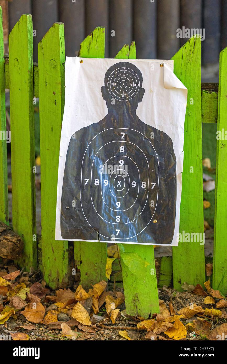 Human Silhouette Paper Gun Range Shooting Target at Fence Stock Photo ...