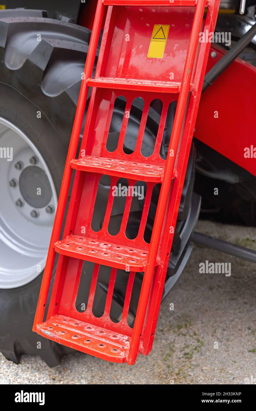 Red Ladder at Tall Combine Harvester Machine Stock Photo - Alamy