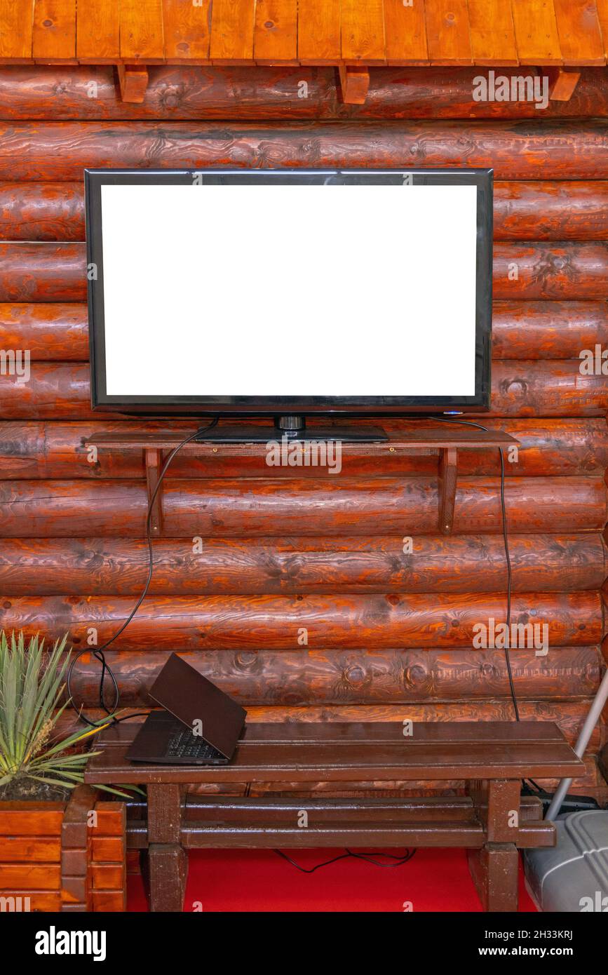 Lcd TV Set in Wooden Logs Cabin House Stock Photo - Alamy