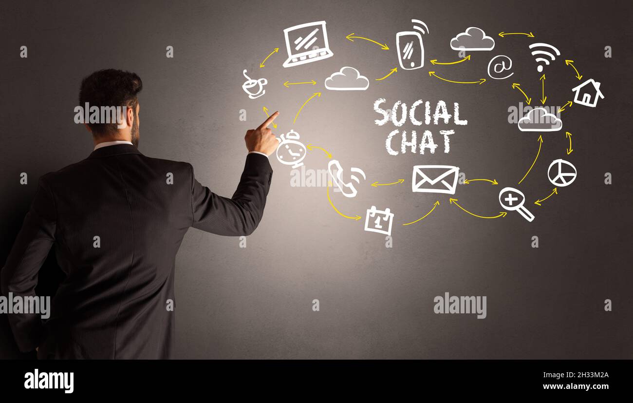 businessman drawing social media icons Stock Photo - Alamy