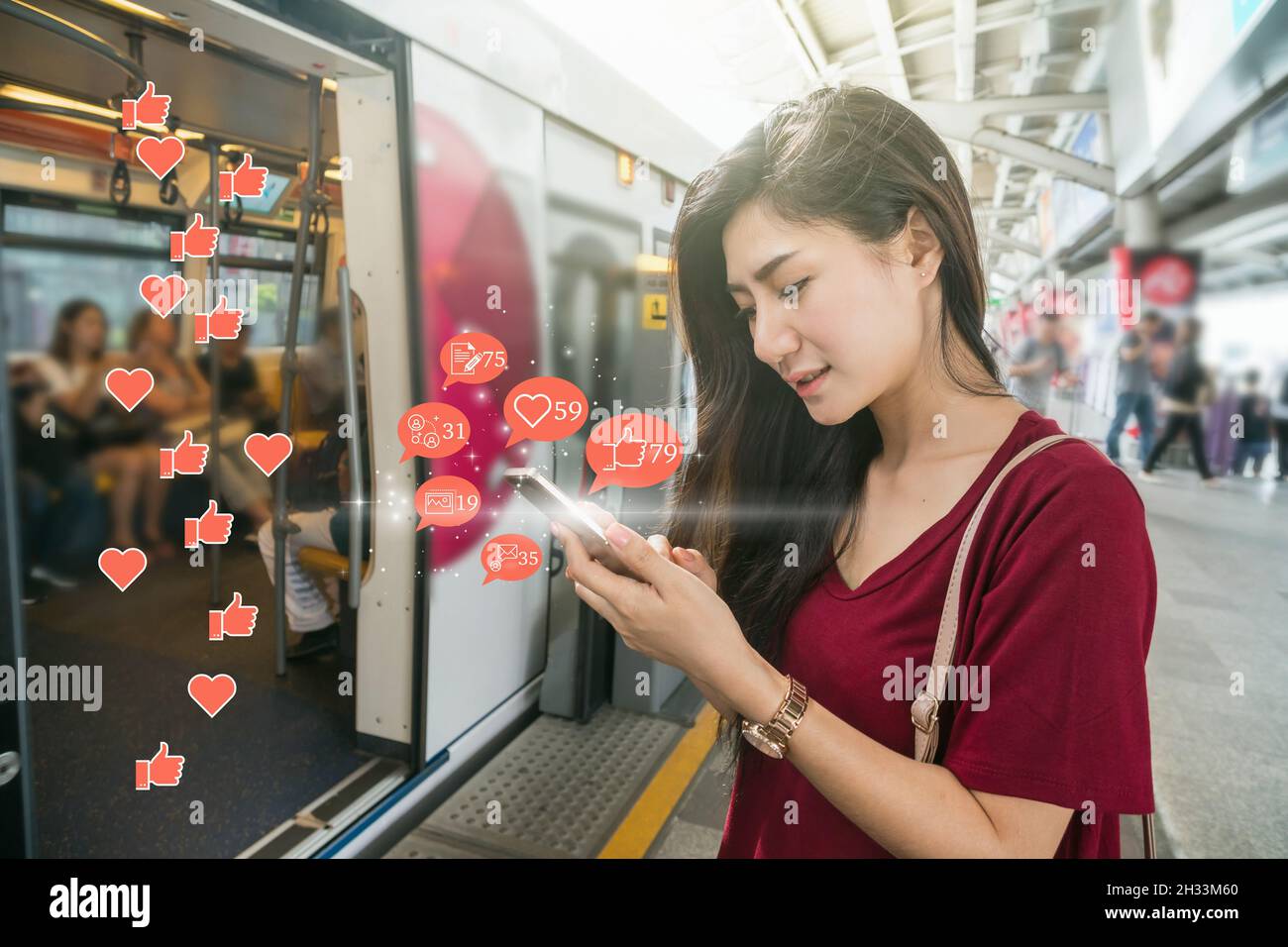 Asian woman passenger using mobile phone to check social network ...