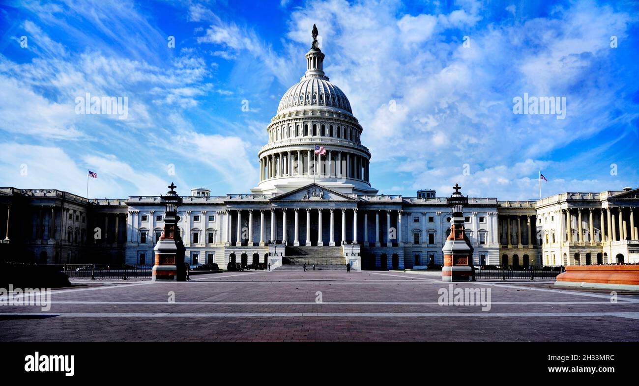 United State Capitol Building for congress with american flag flowing ...