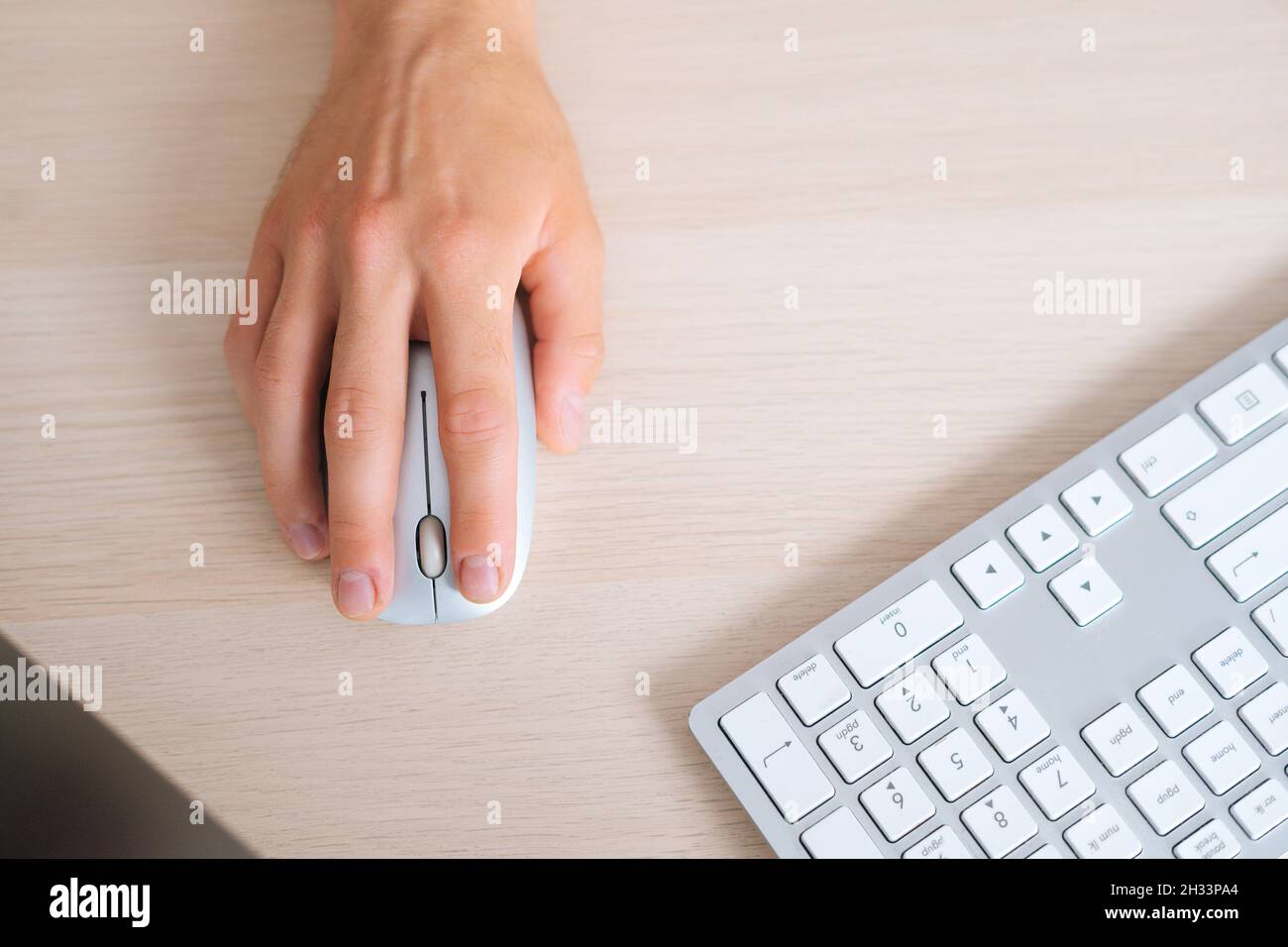 Close-up top view hands of unrecognizable business man using wireless ...