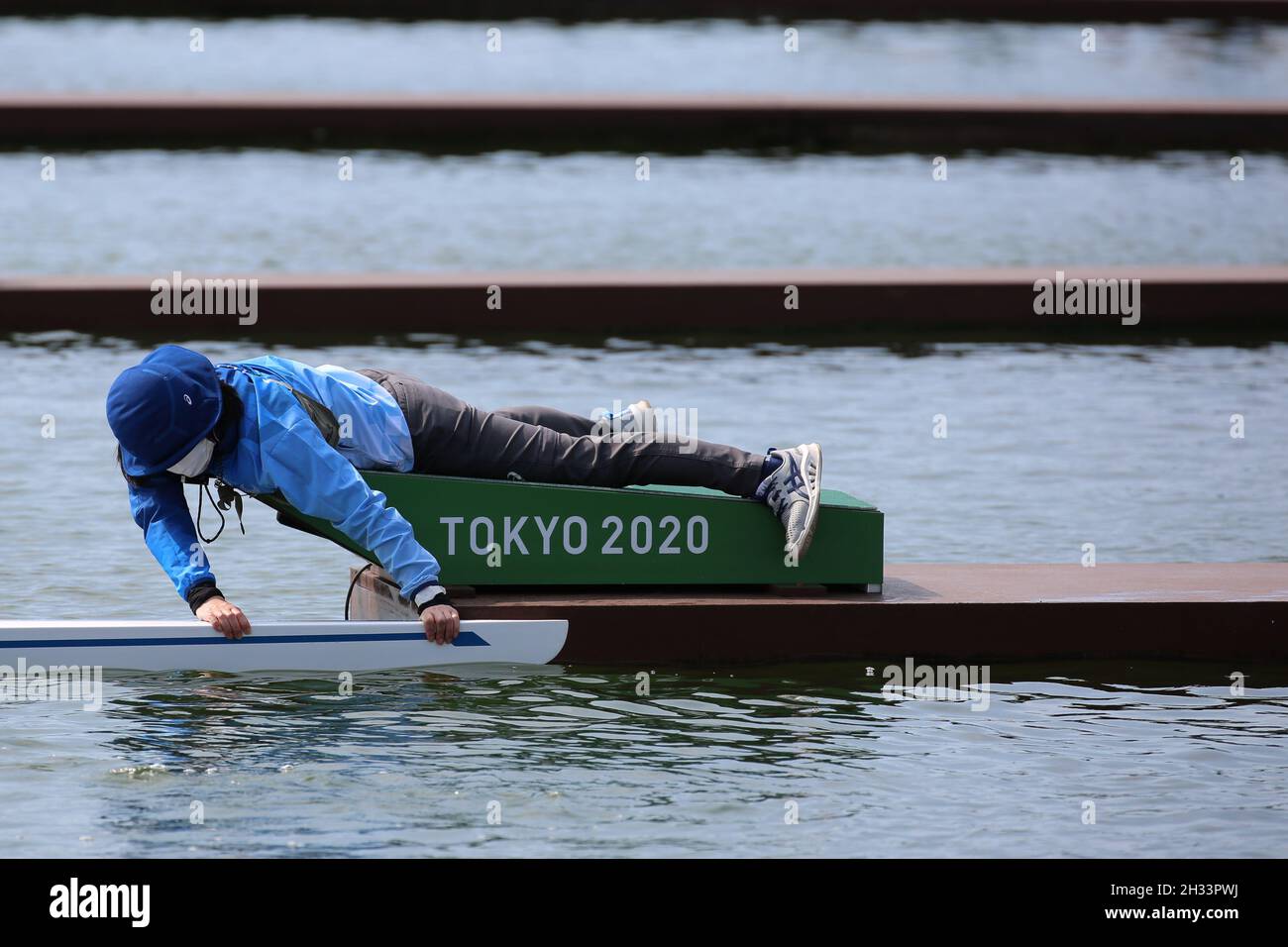JULY 23rd, 2021 - TOKYO, JAPAN: boat helper in action before the start ...