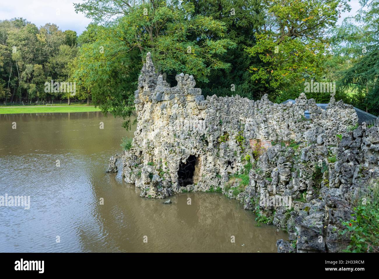 The Crystal Grotto folly and lake at Painshill Park, Cobham, Surrey ...