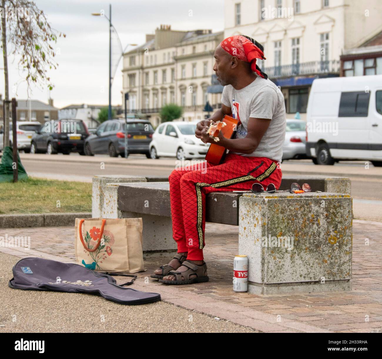 Busking money hi-res stock photography and images - Alamy