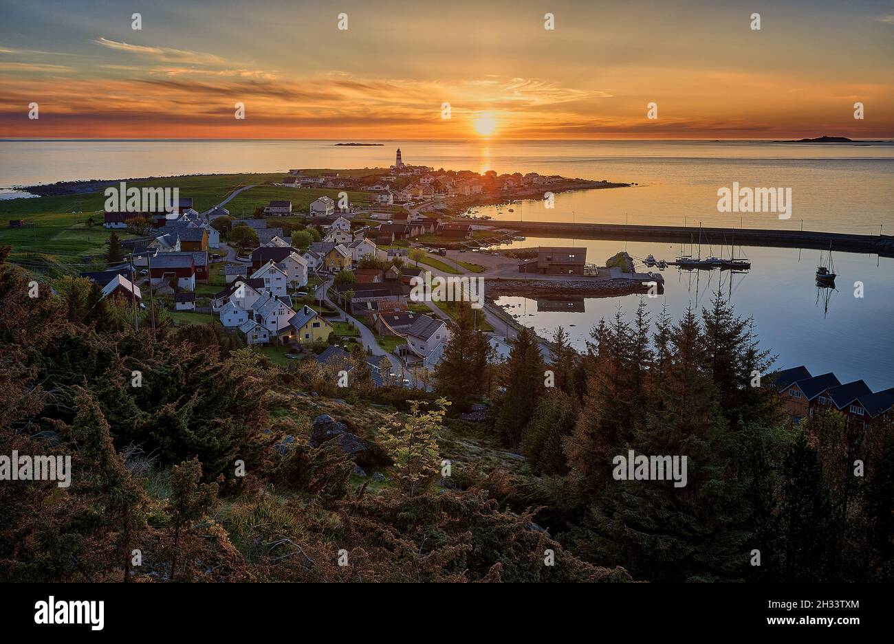 A warm setting sun over Alnes, Norway Stock Photo - Alamy