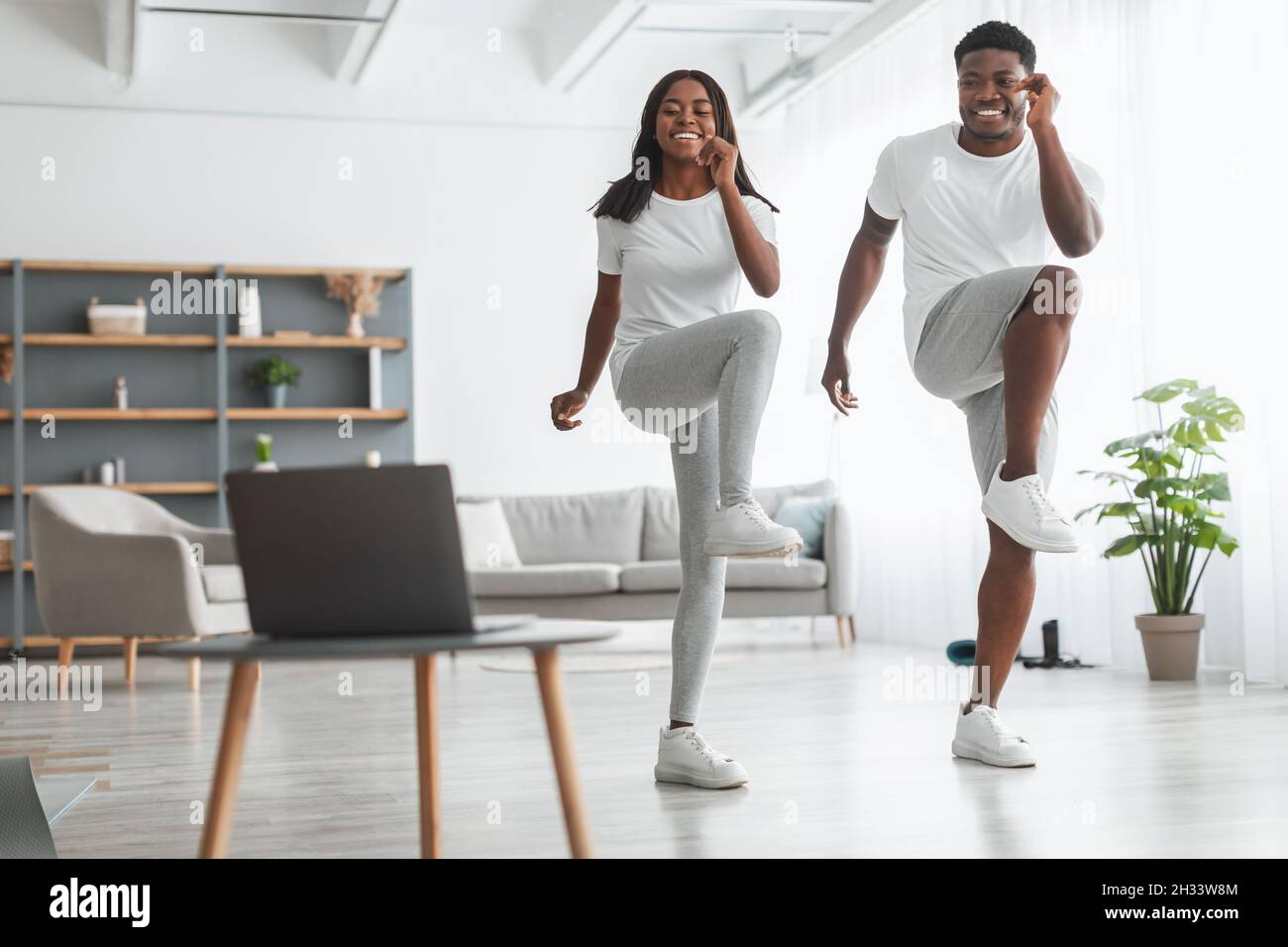 Online Family Workout. African American Husband And Wife Training ...