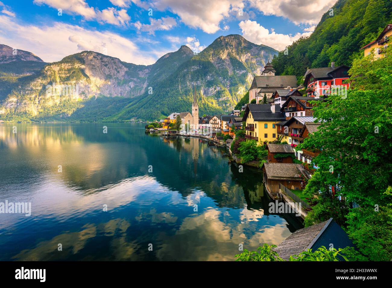 View of famous Hallstatt mountain village in the Austrian Alps at ...