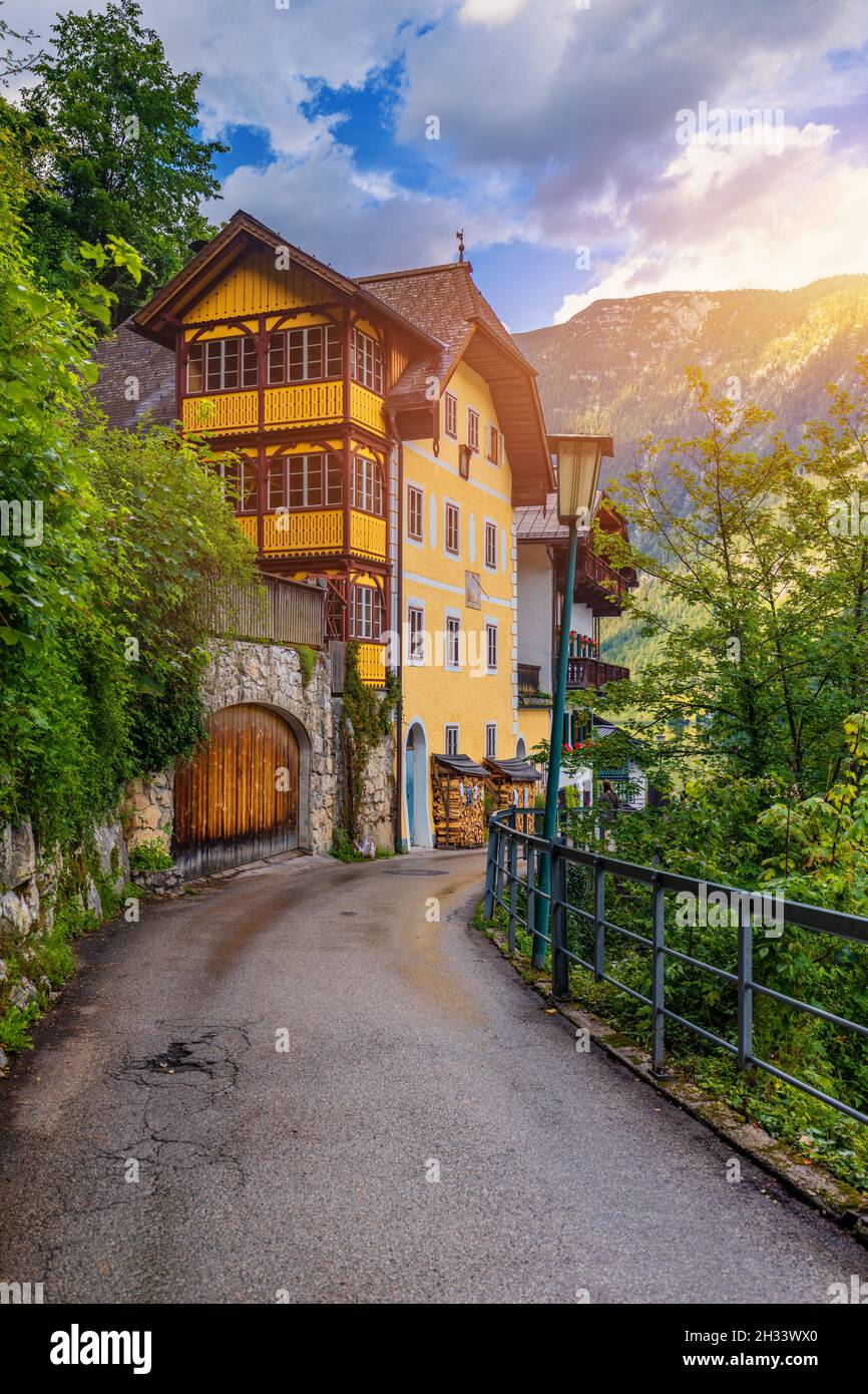 Scenic picture-postcard view of famous Hallstatt mountain village in the Austrian Alps ...