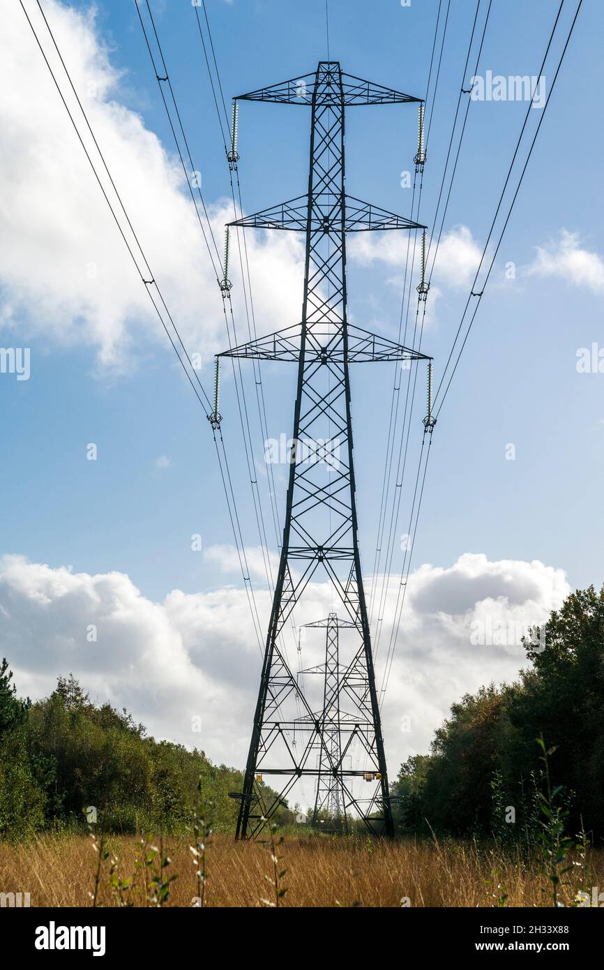 Pylon of the united Kingdom National Grid with overhead transmission ...