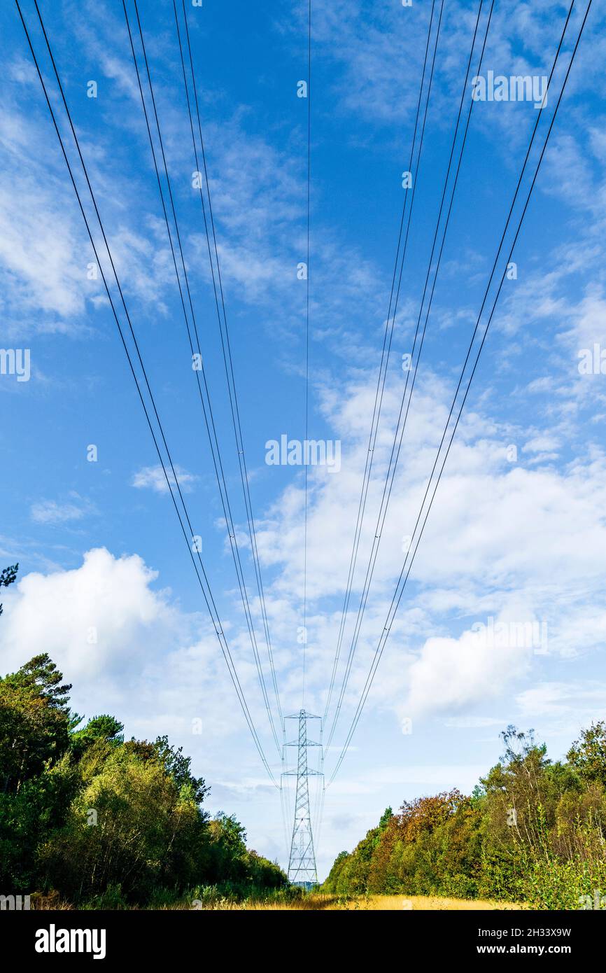 Pylon of the united Kingdom National Grid with overhead transmission ...
