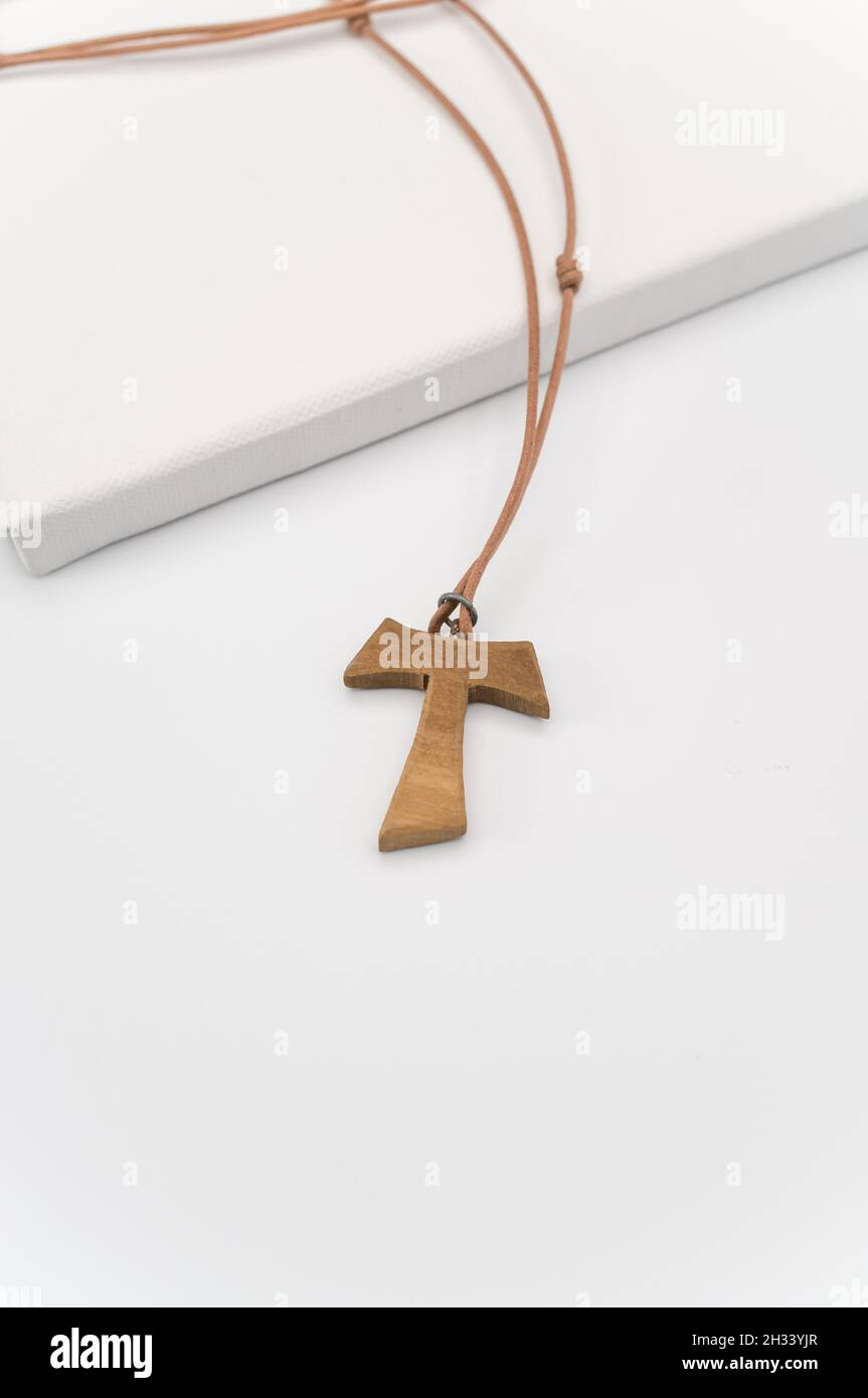 hand made wooden tau cross pendant - Greek letter tau on a white ...
