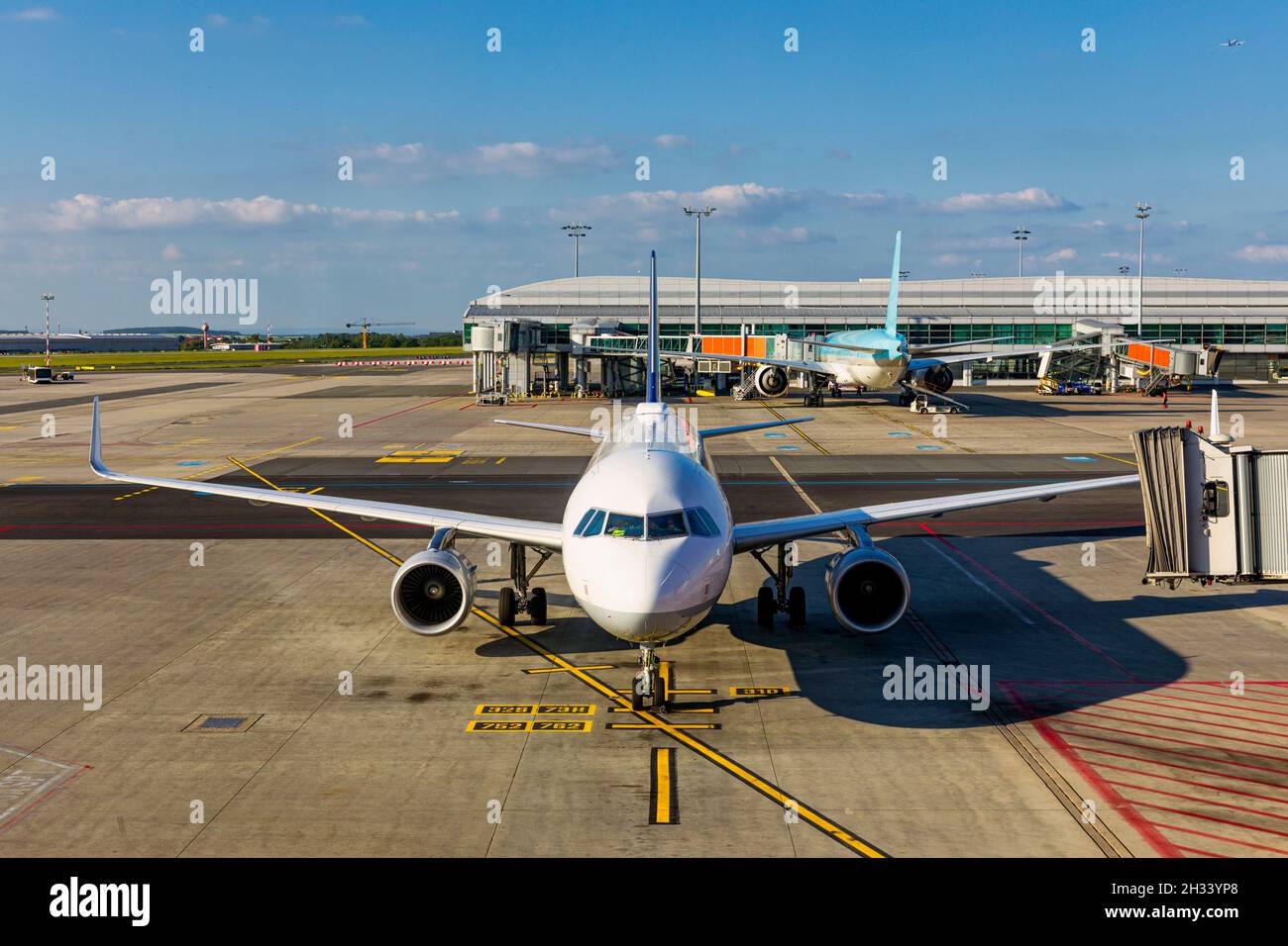 Passenger airplane getting ready for flight. Front view of landed ...