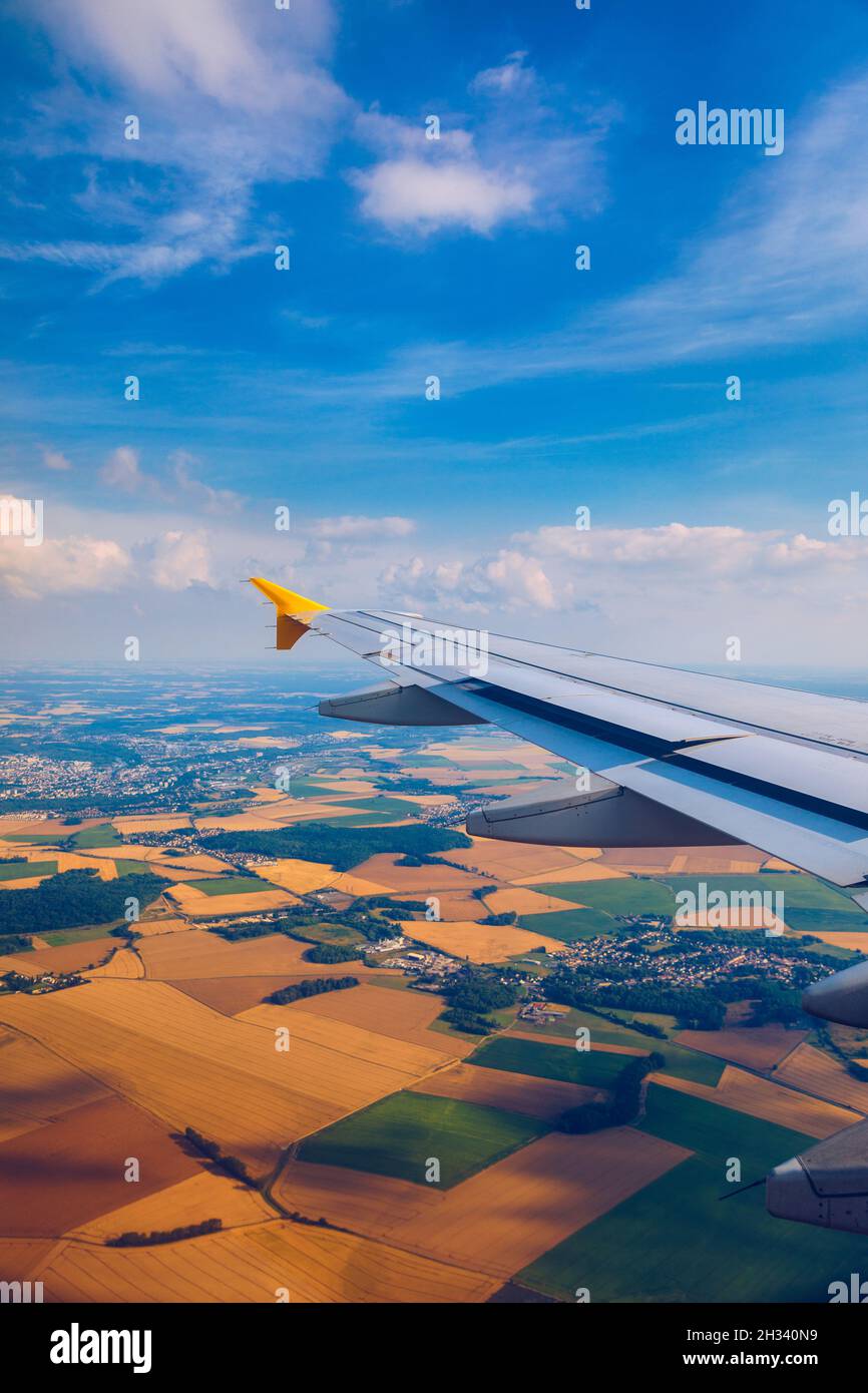 Airplane windows view above the earth on landmark down. View from an ...