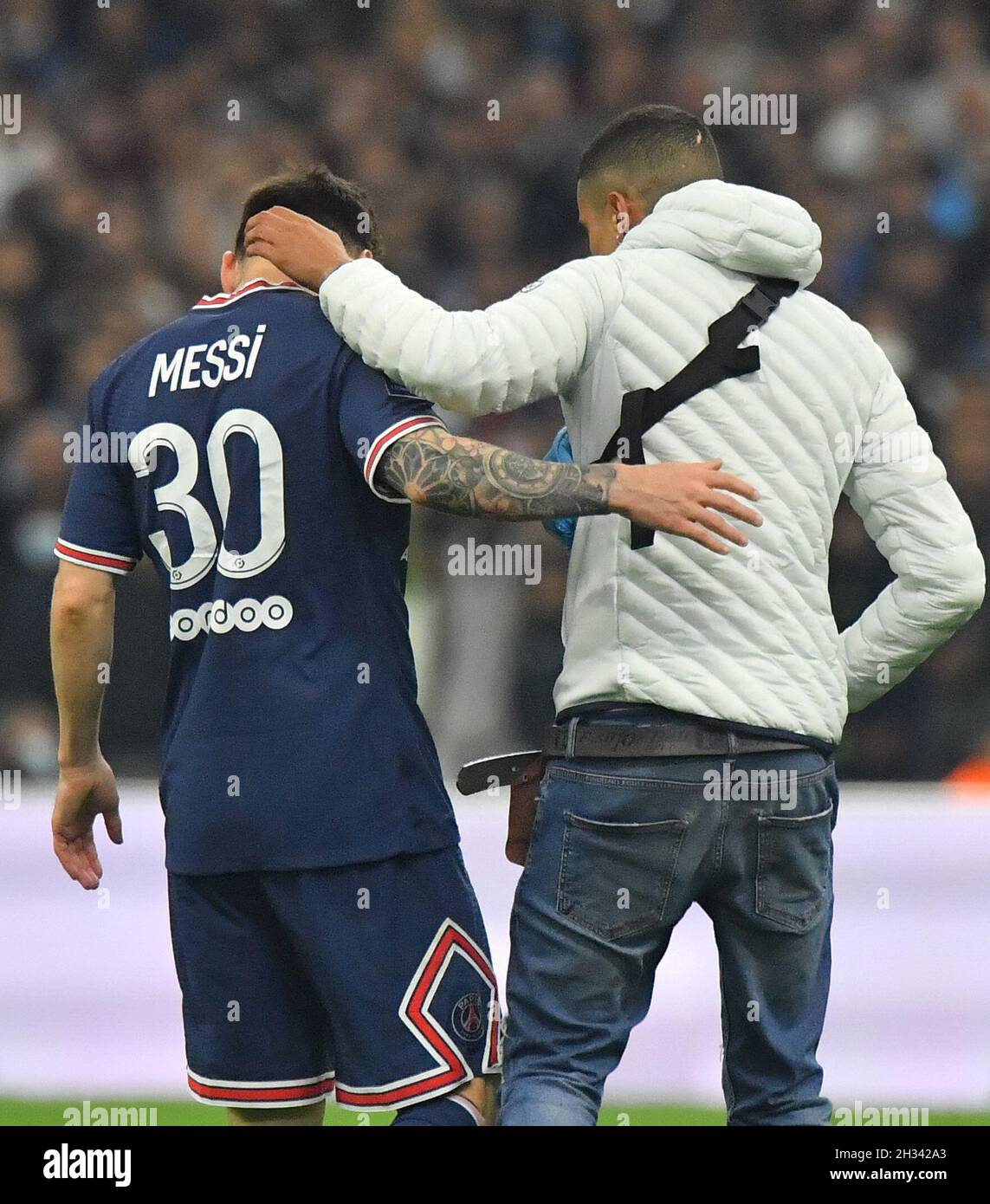 An intruder approaching Lionel Messi of PSG during the French ...