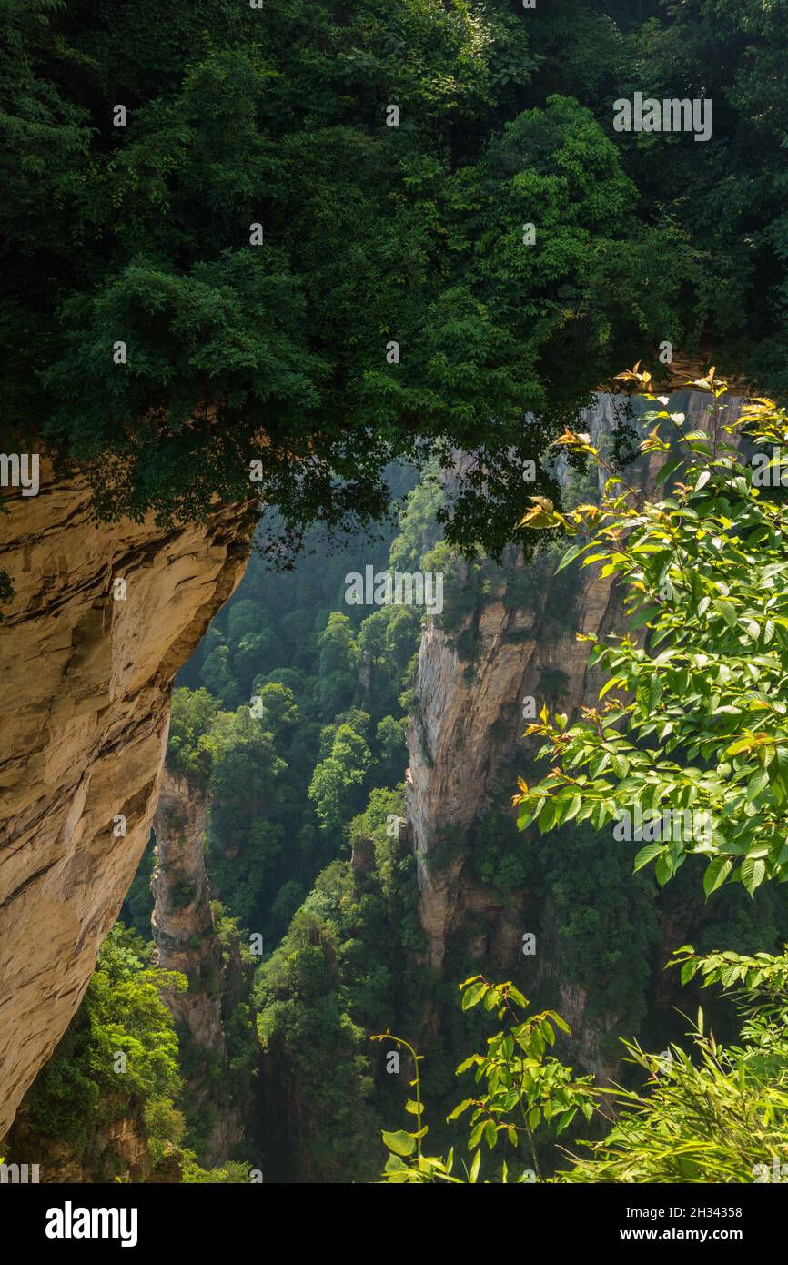 Looking through Tian Xia Di Yi Qiao, a natural stone arch in ...